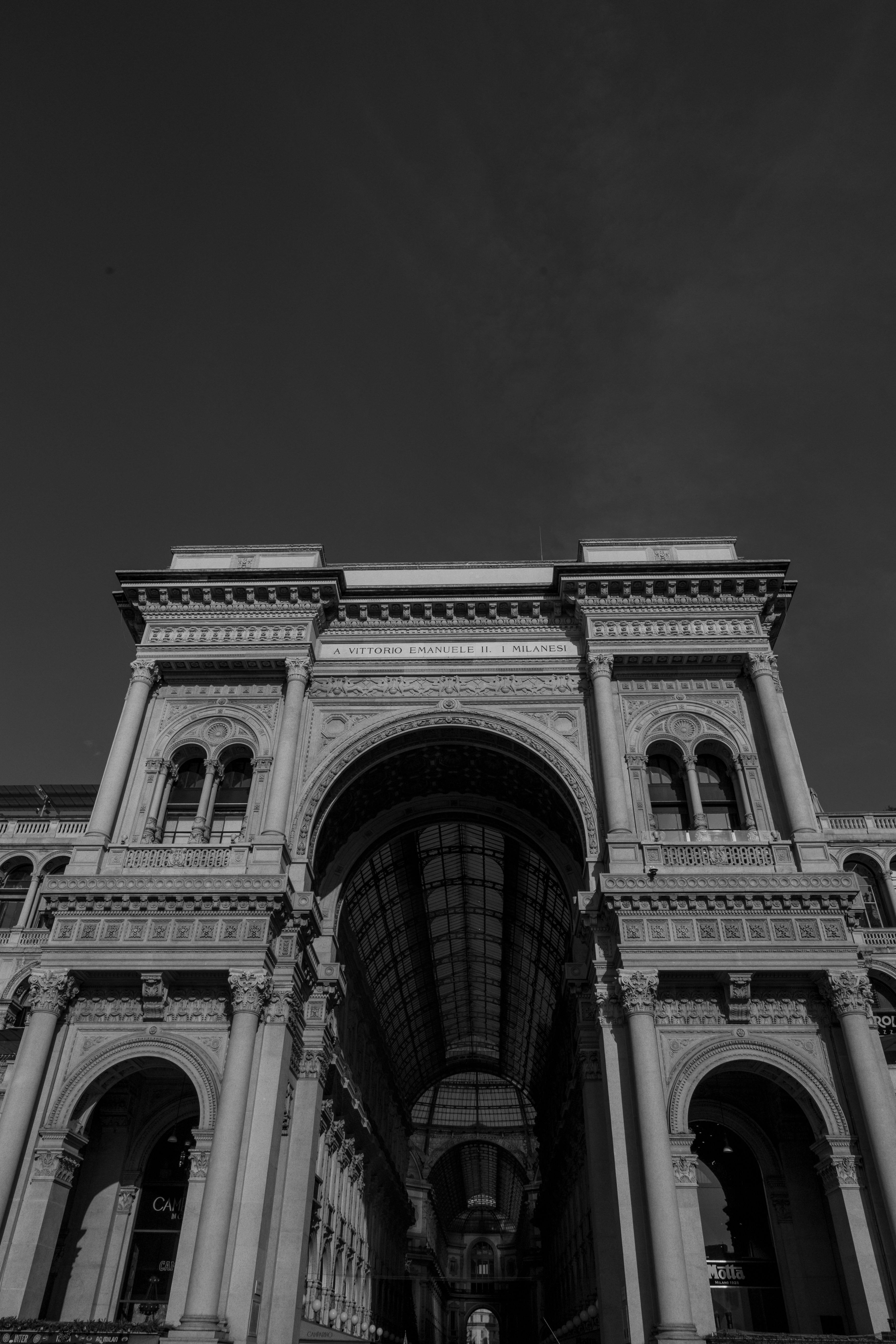 Archway of Grandeur: A Monumental Milan Gate in Monochrome