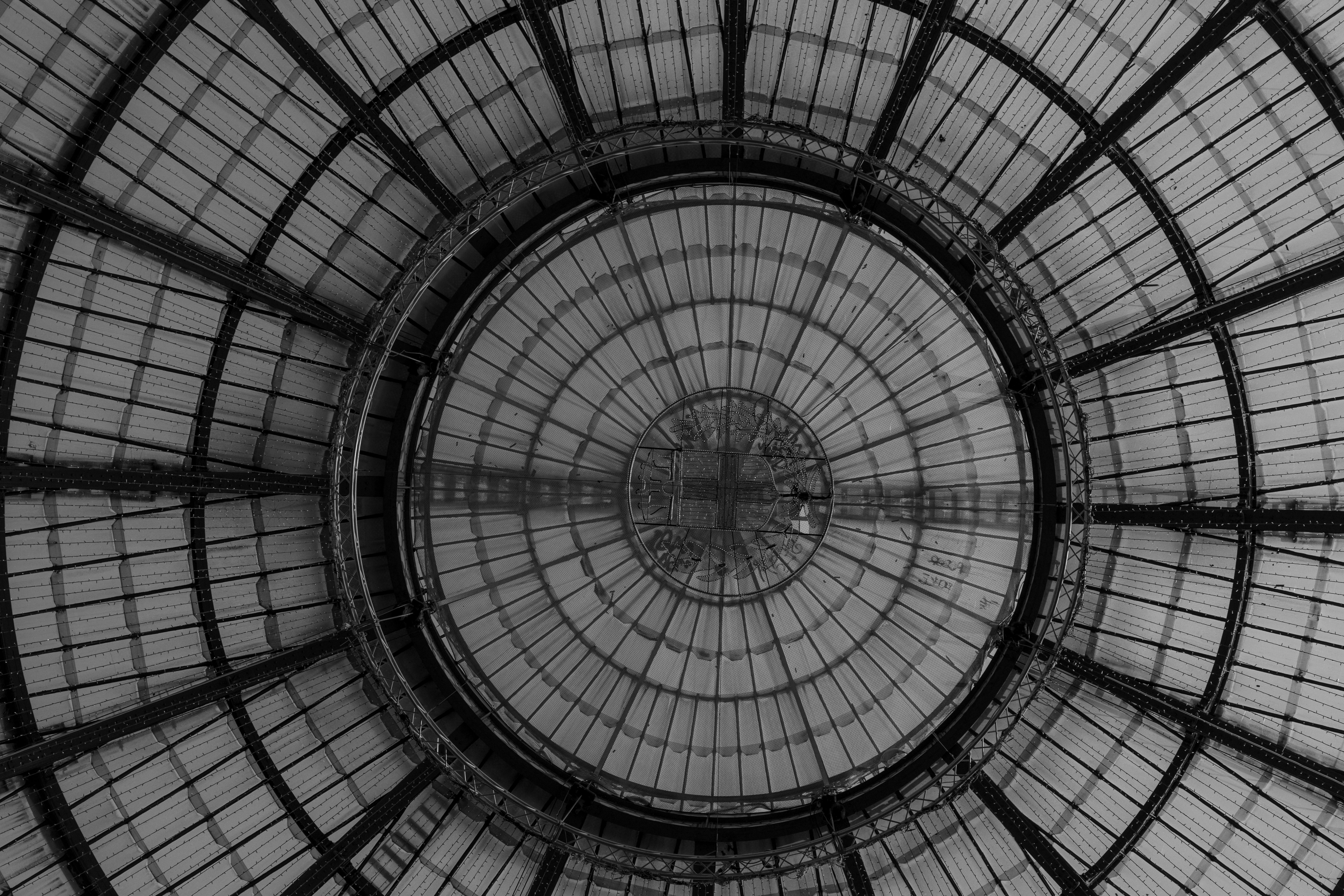 Concentric Vault: A Circular Glass Atrium's Central Vanishing Point