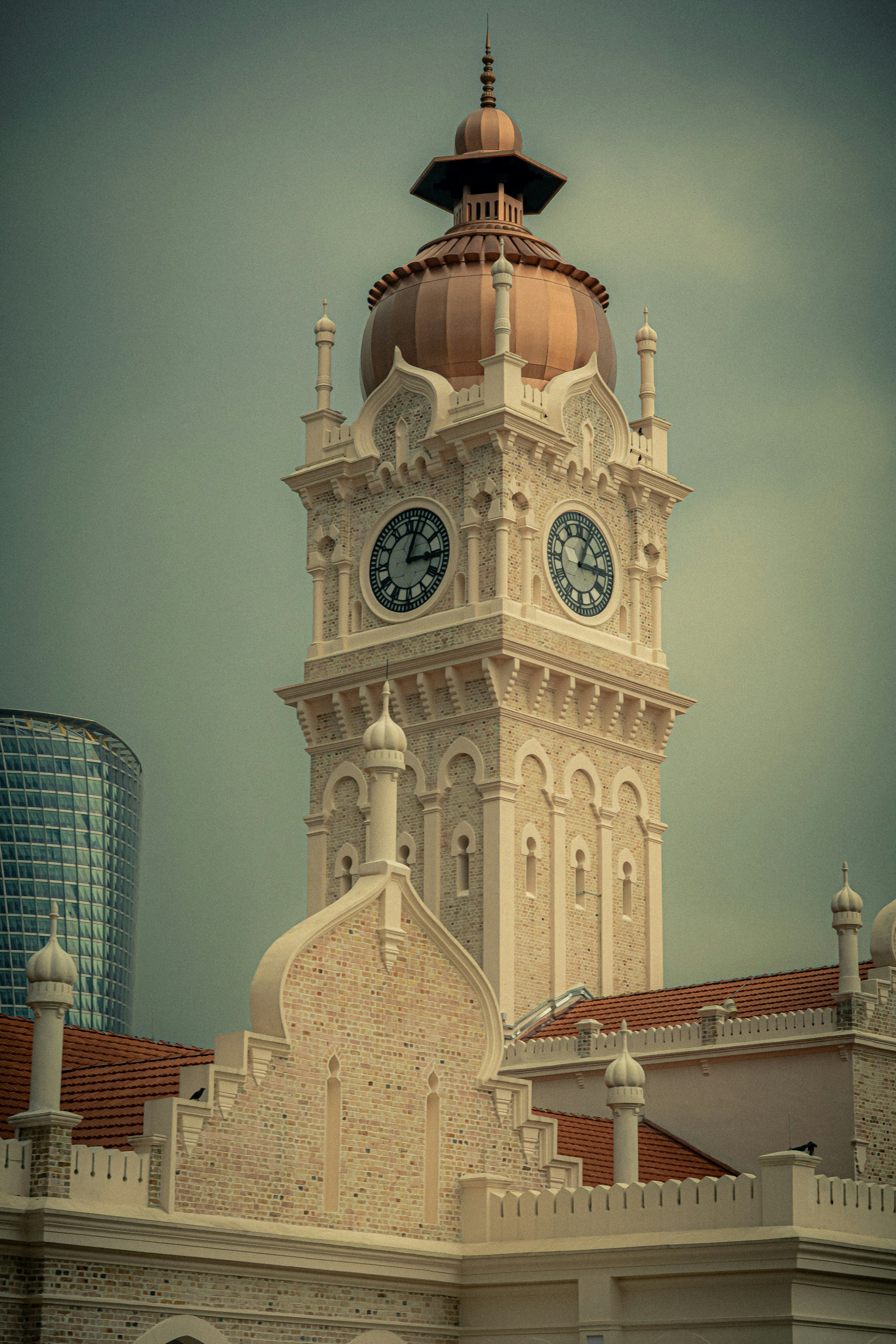 Clock Tower Crown: An Ornate Timepiece Rising Above Rooftops