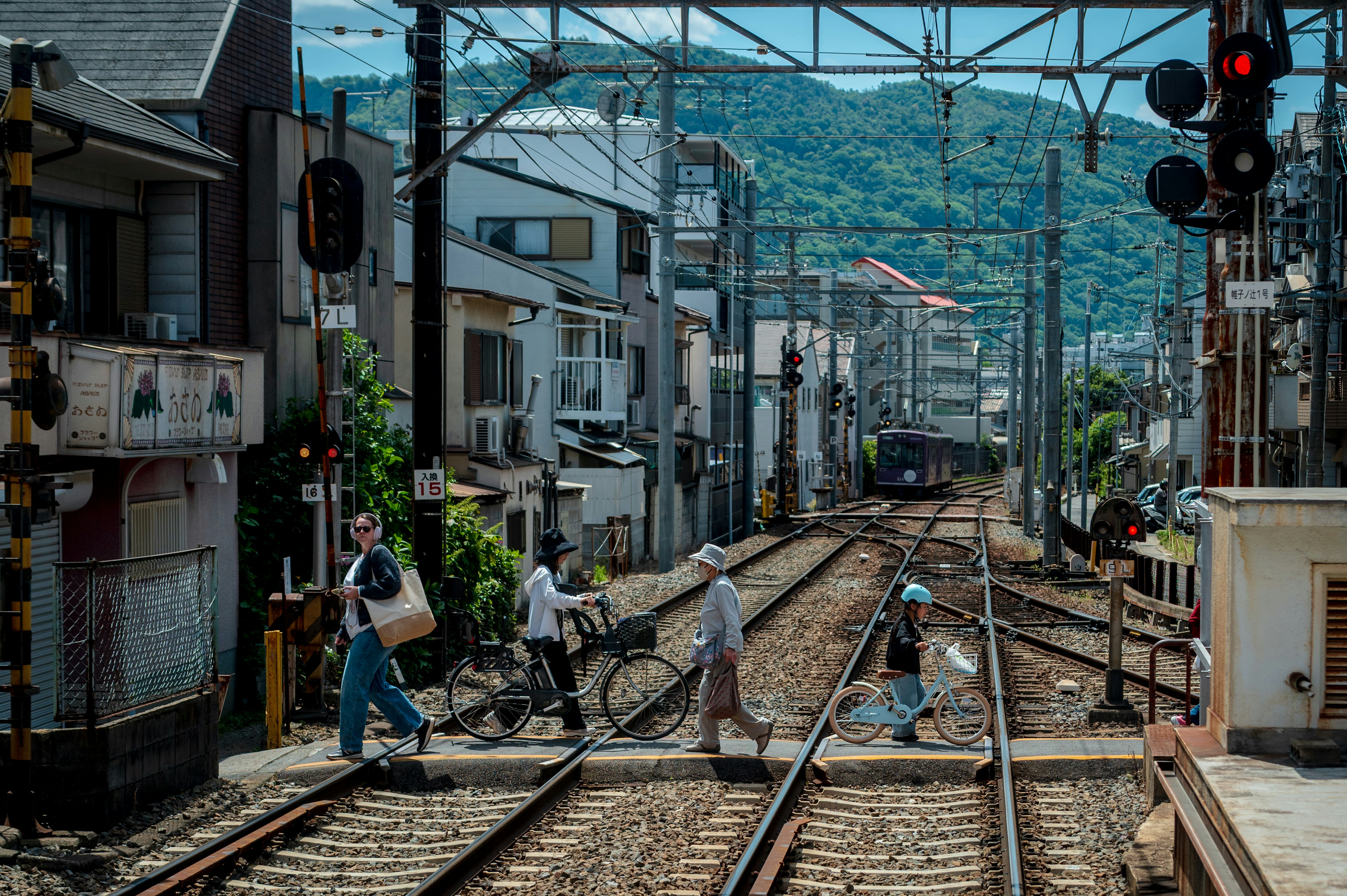 Crossing at the Quiet Rails: A Street-Level Moment