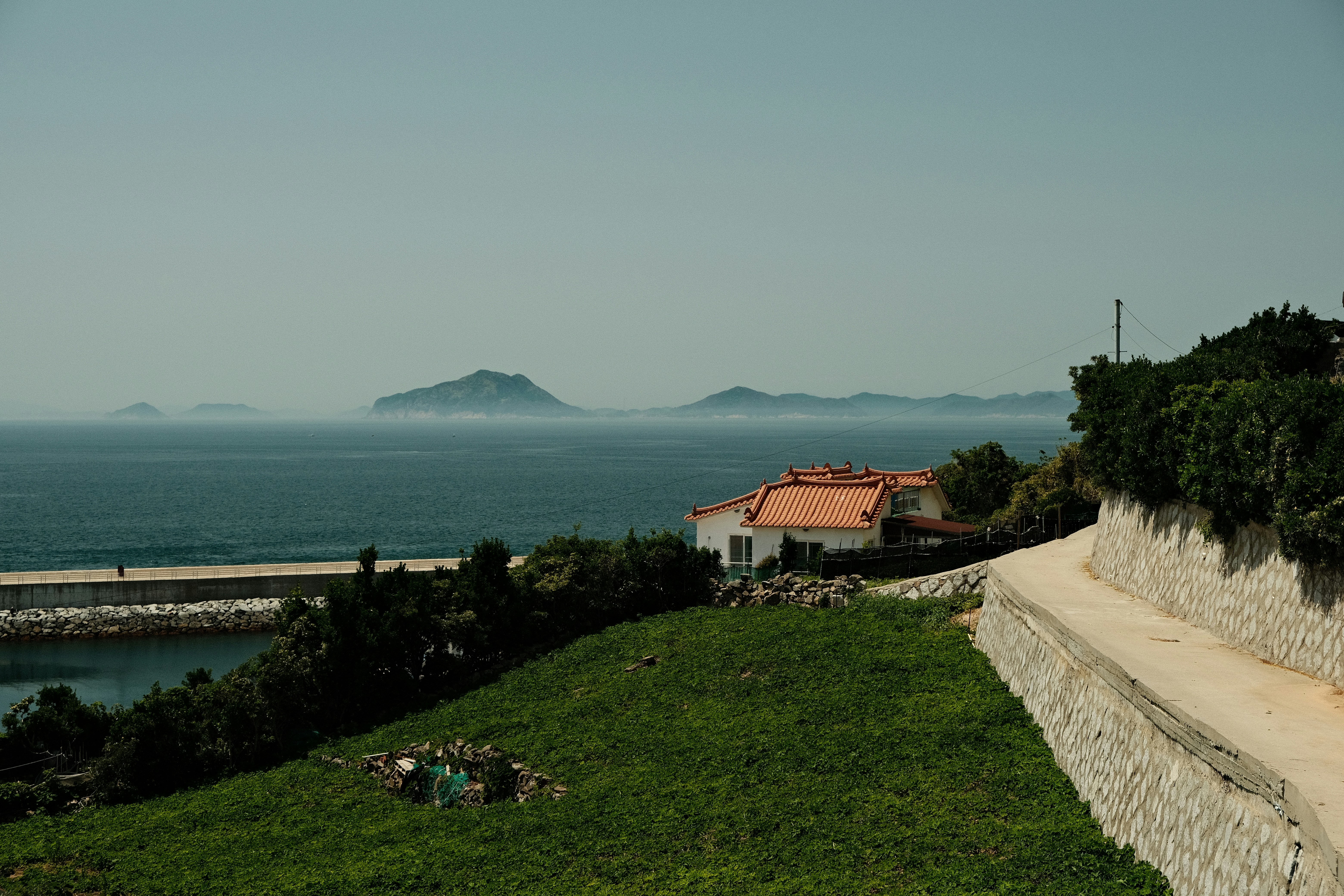 Coastal Terrace: A Quiet Path Along the Sea Wall