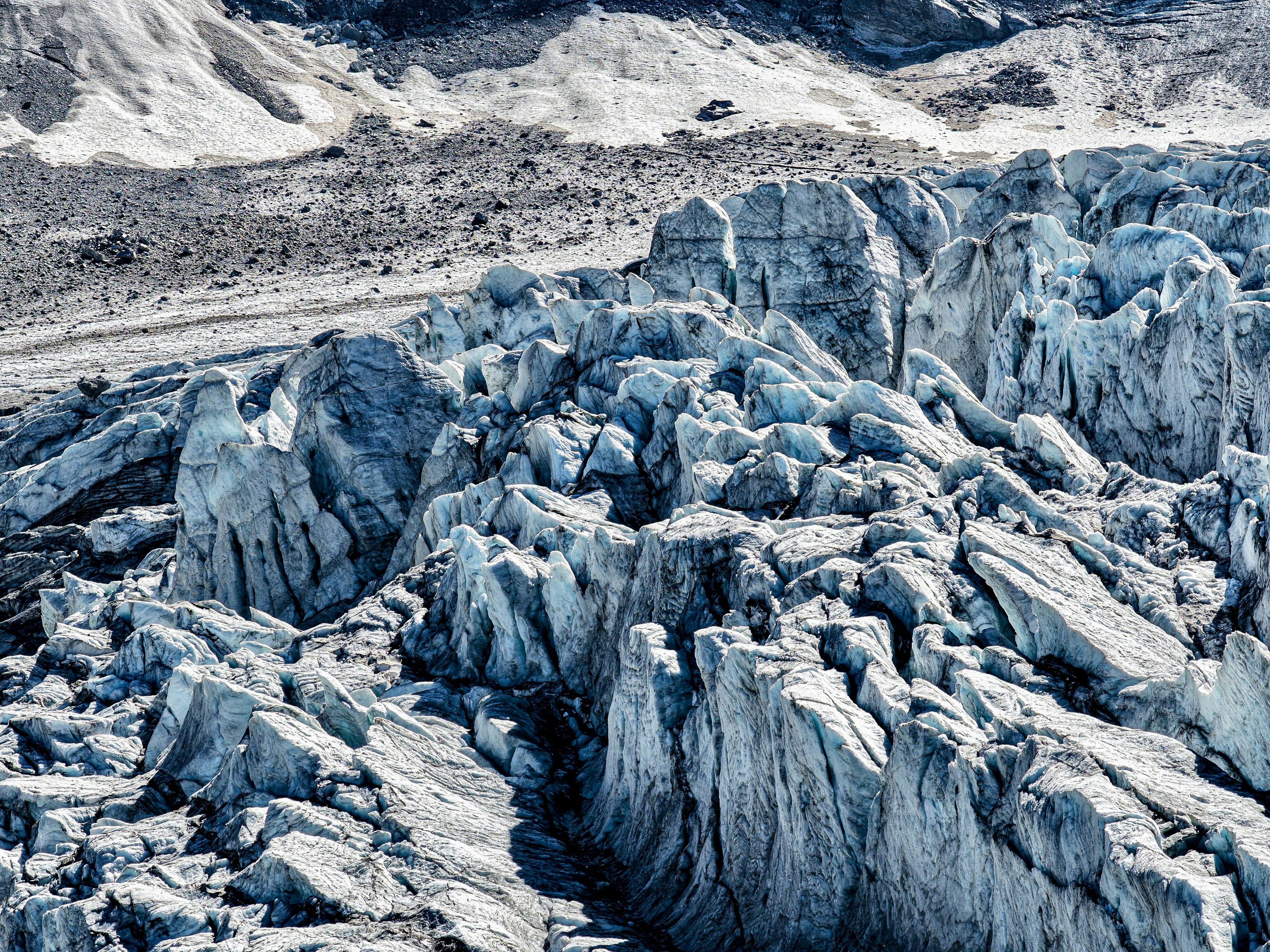 Glacial Chasm: A Sea of Ice Formations in Cold Light