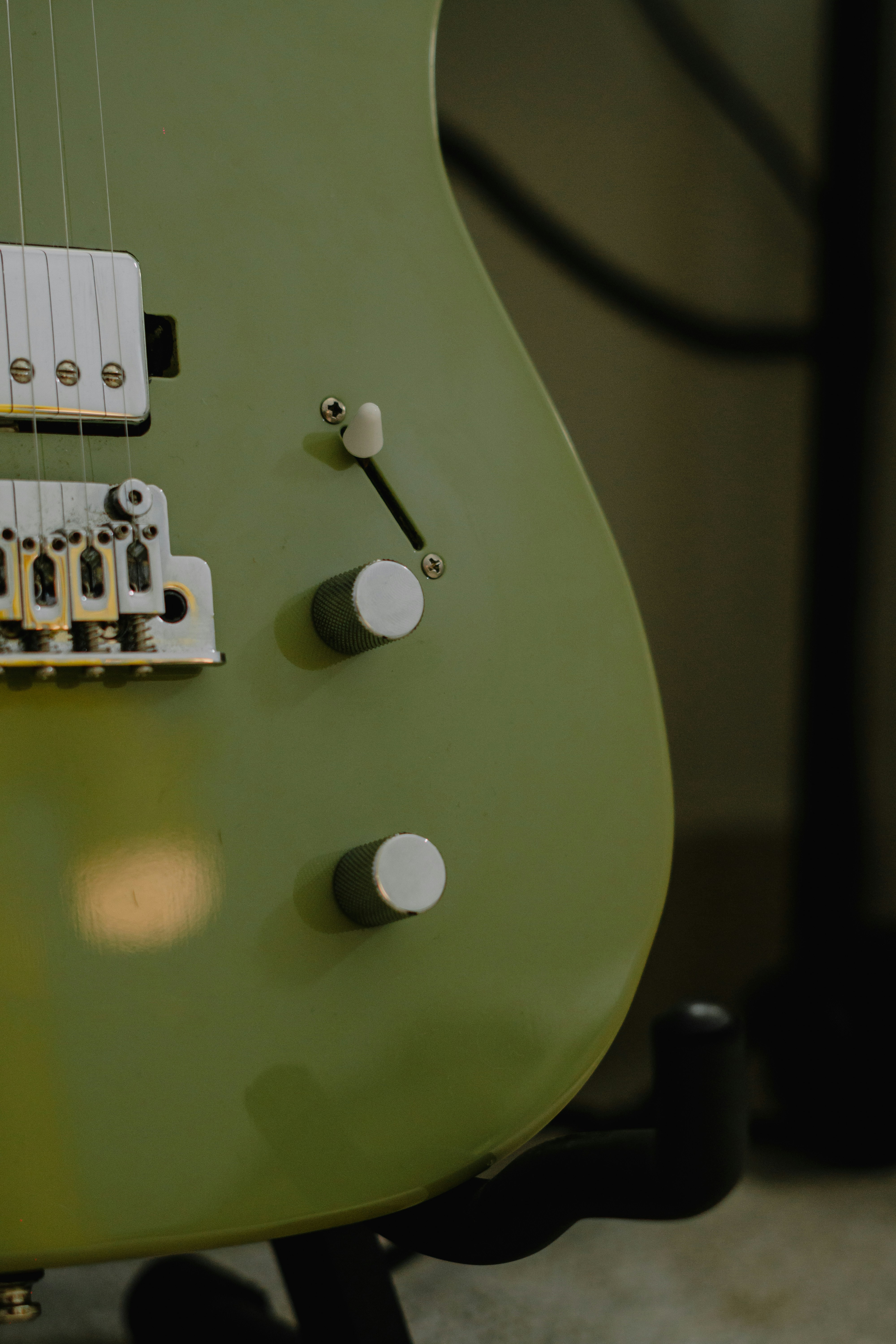 Pastel Green Telecaster: Close-up on Bridge and Control Knobs