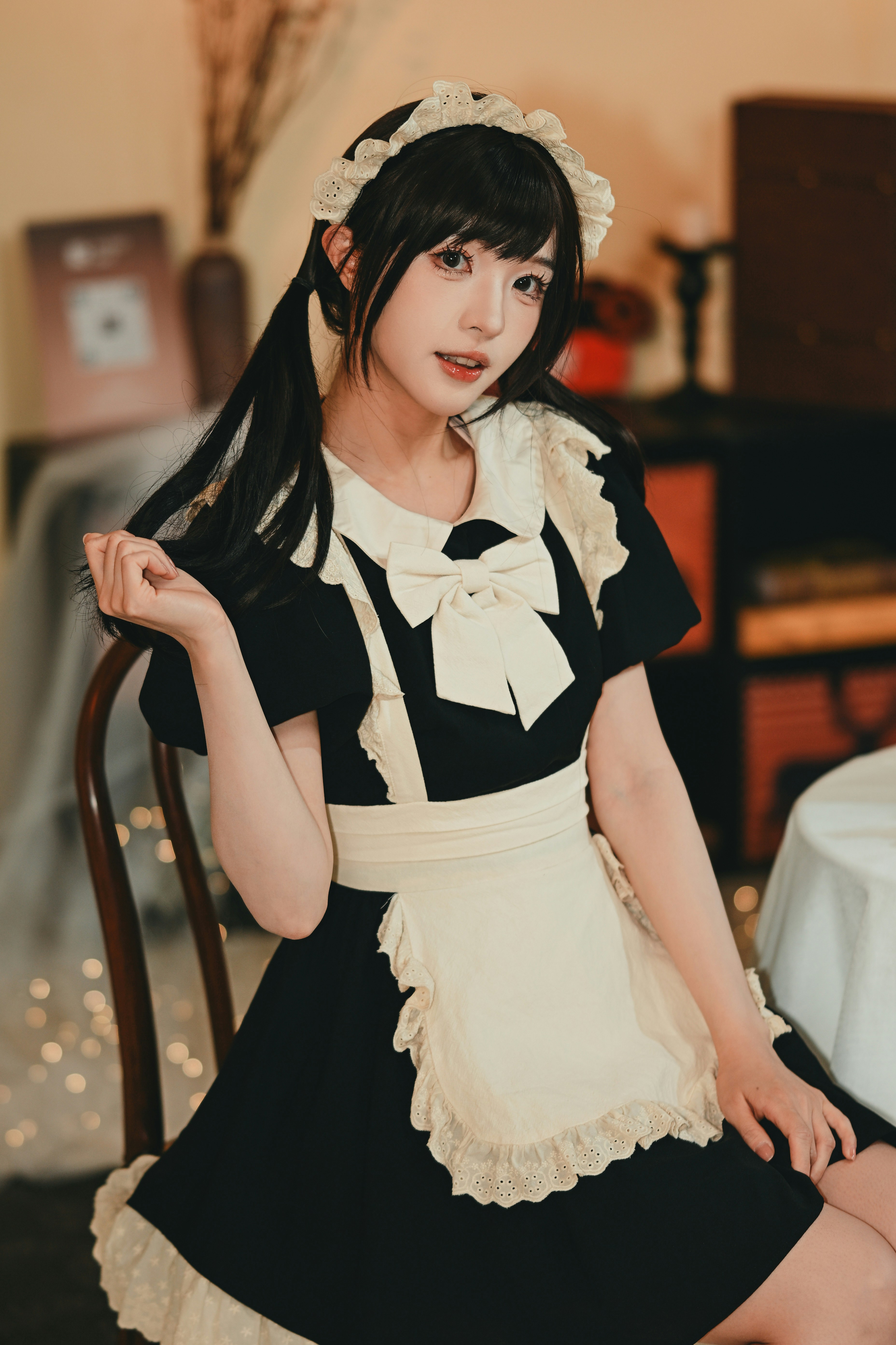  maid in monochrome: a delicate maid portrait with lace and bow