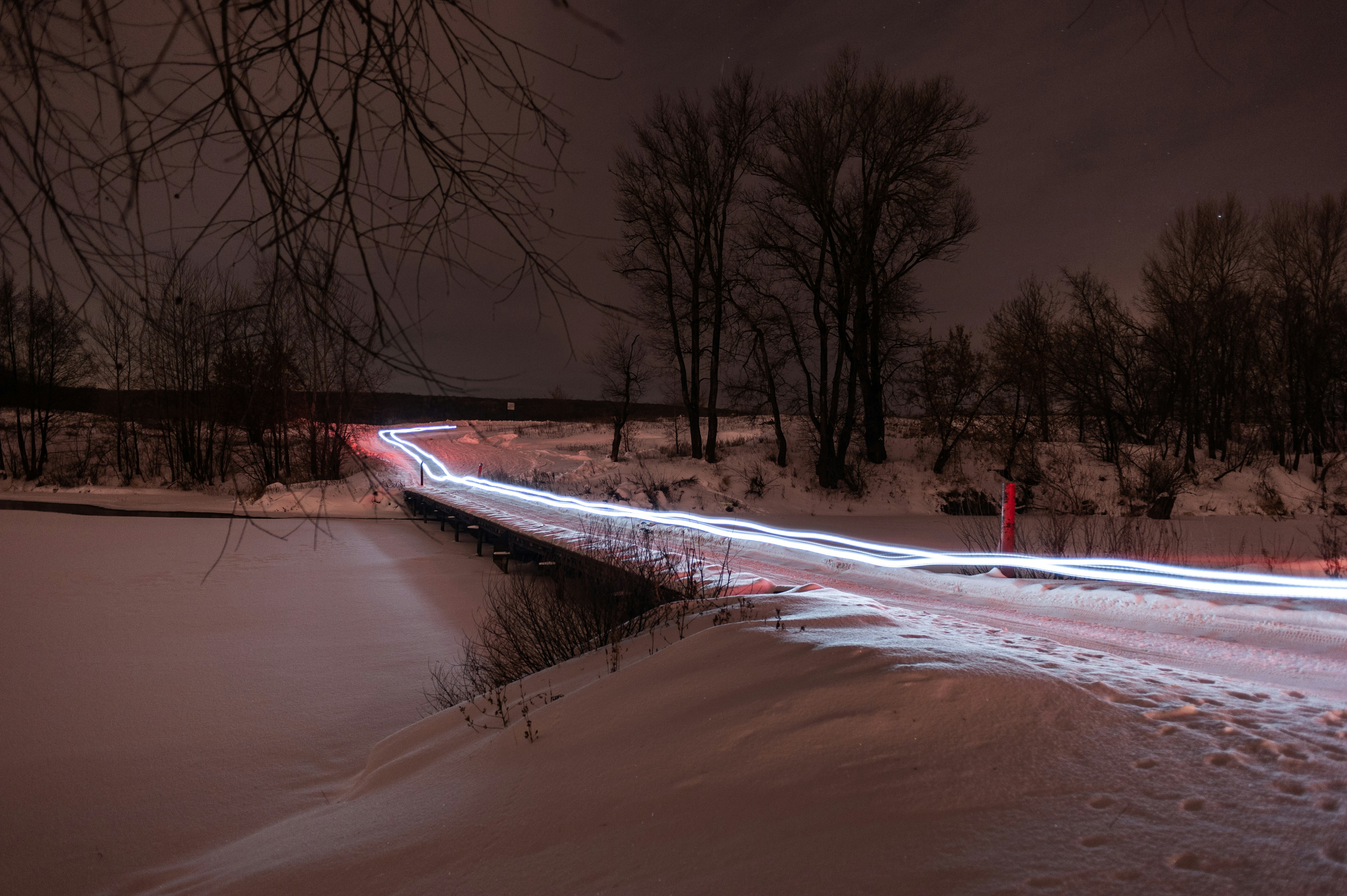 Snow-lit Path of Light: A Quiet Night Crossing
