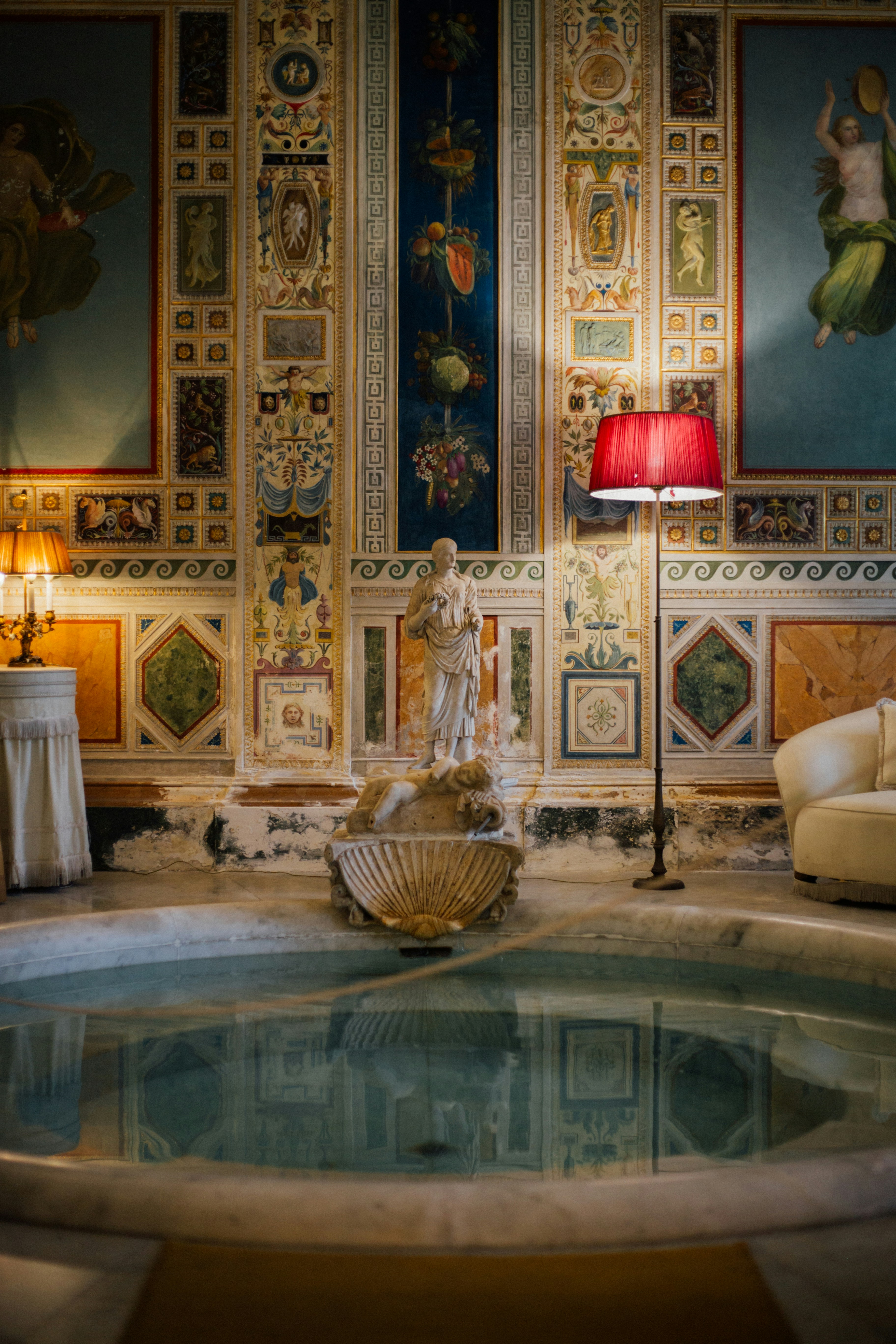 Luxuriant Poolside Atelier with Baroque Tapestry and Marble Statue