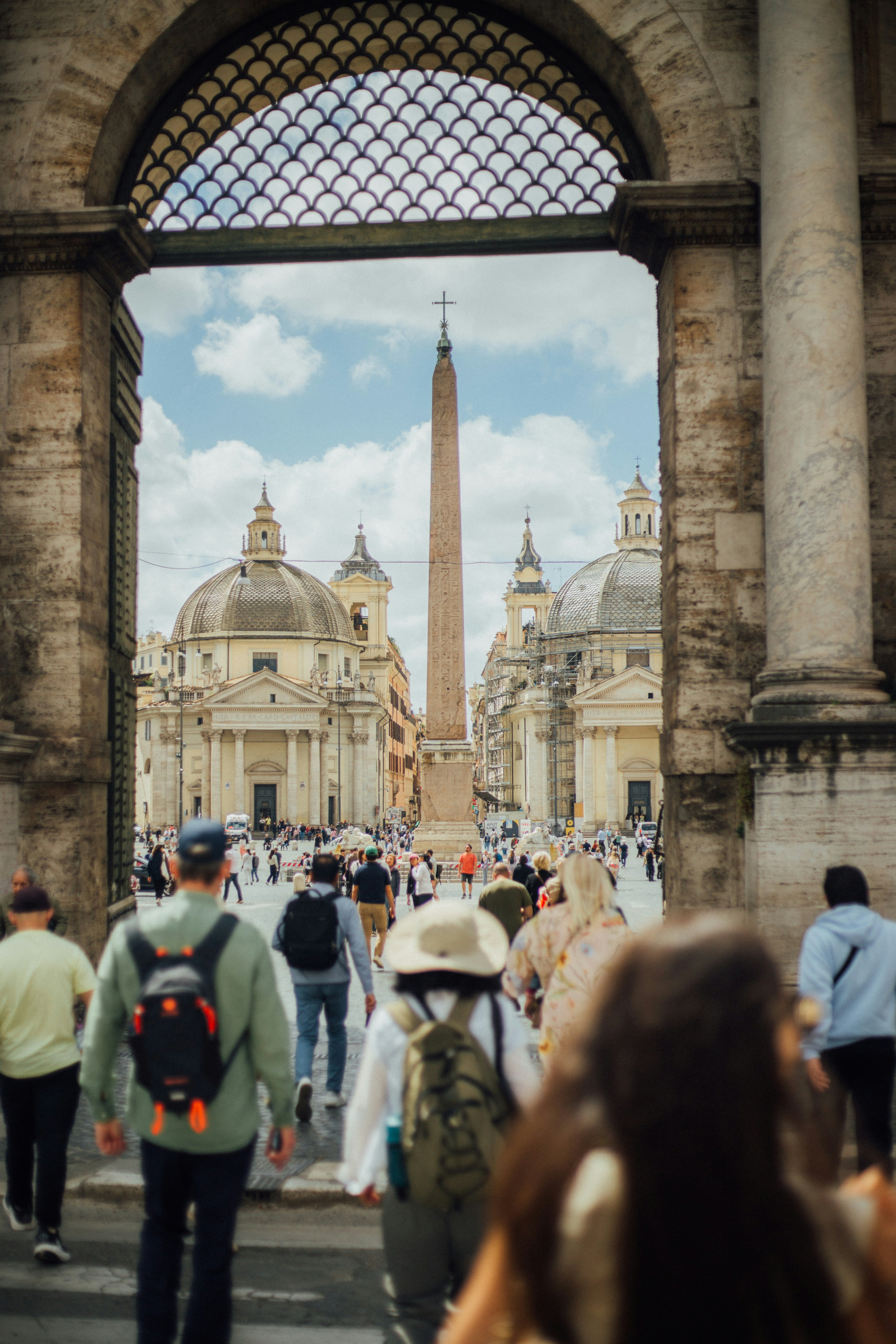 Archway to Rome: Pilgrims and Obelisk Framing the Square