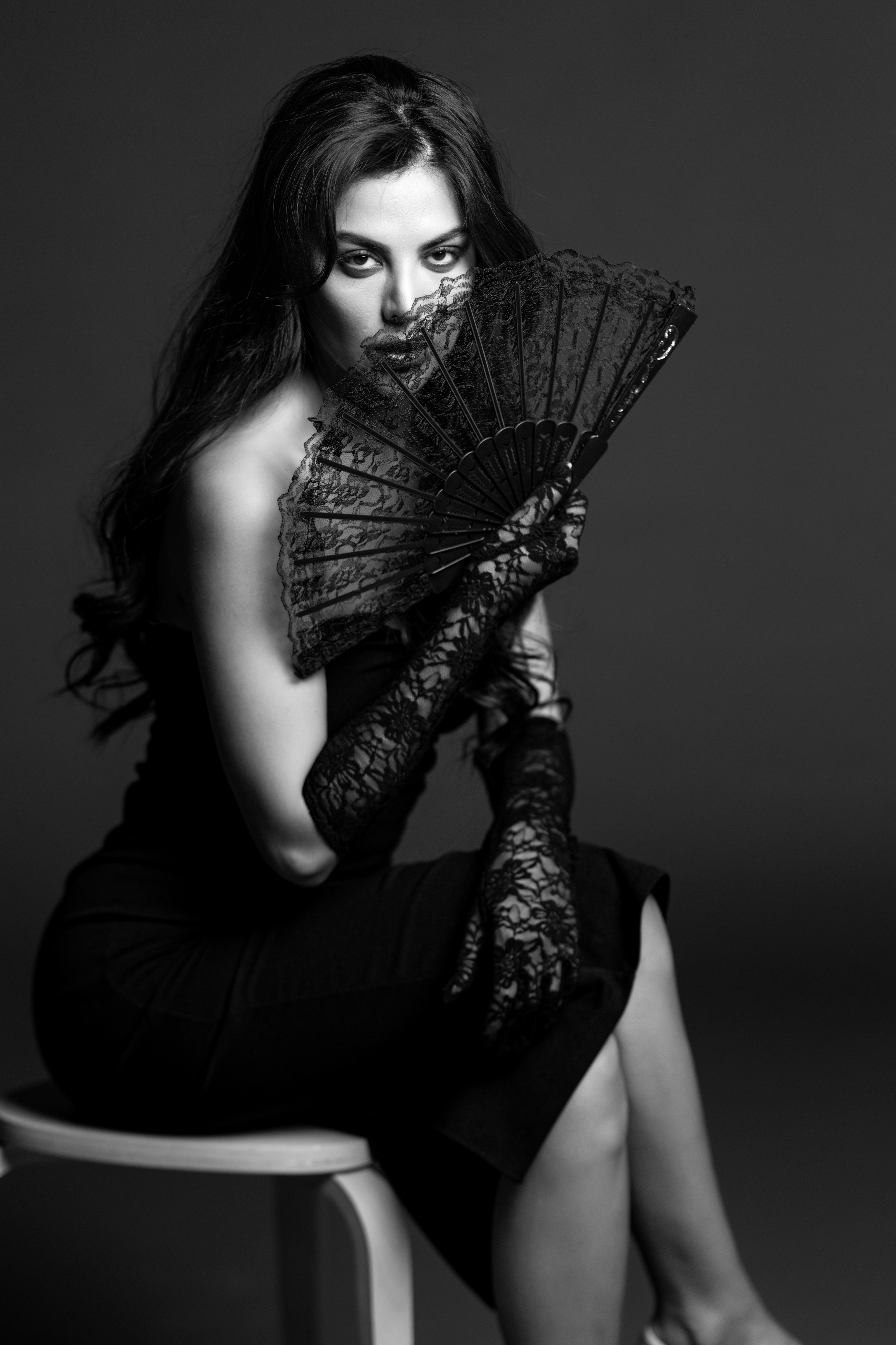 Veiled Allure: A Portrait Shrouded in Lace and Light