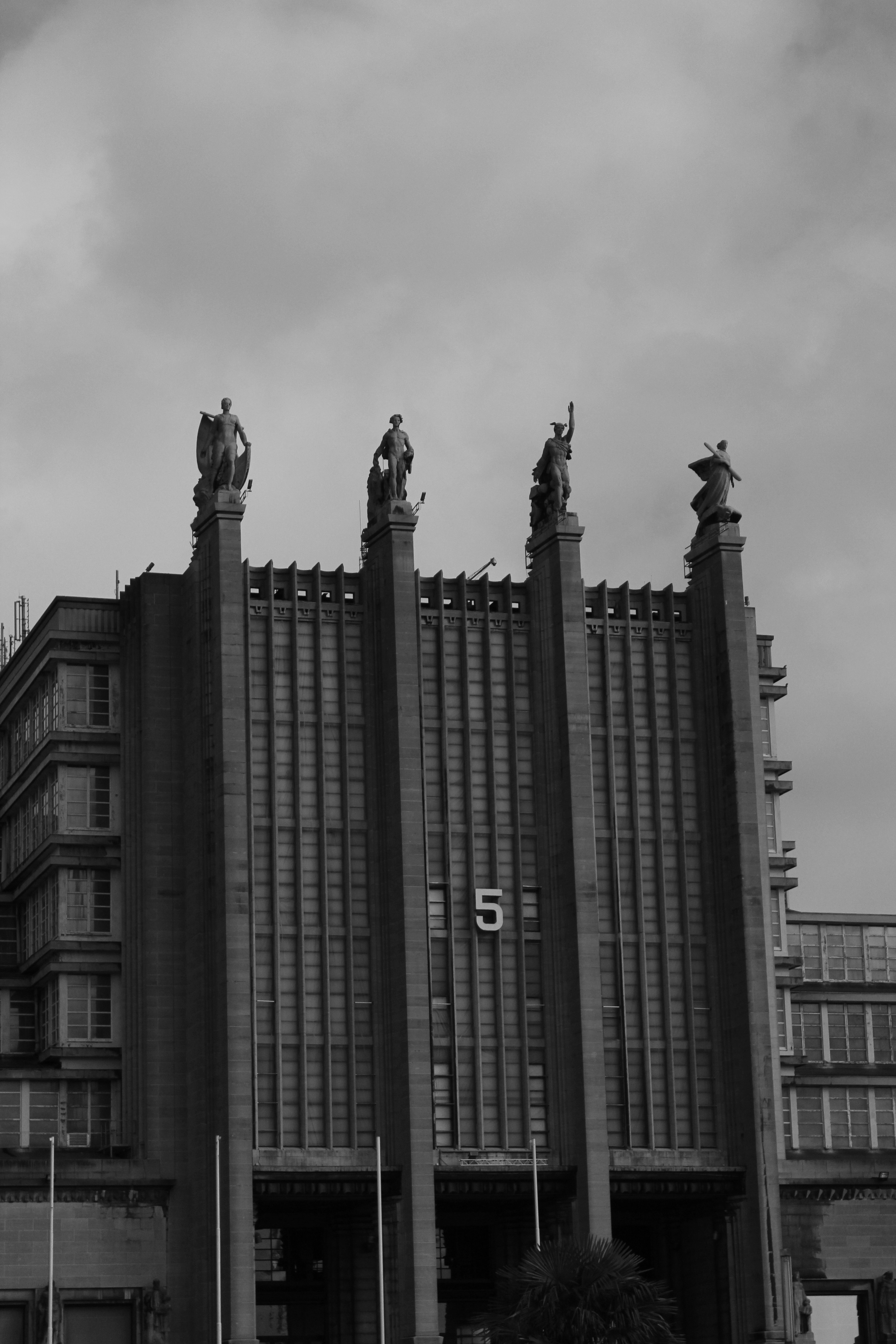 Monumental Facade: Vertical Guardians at Five Spires