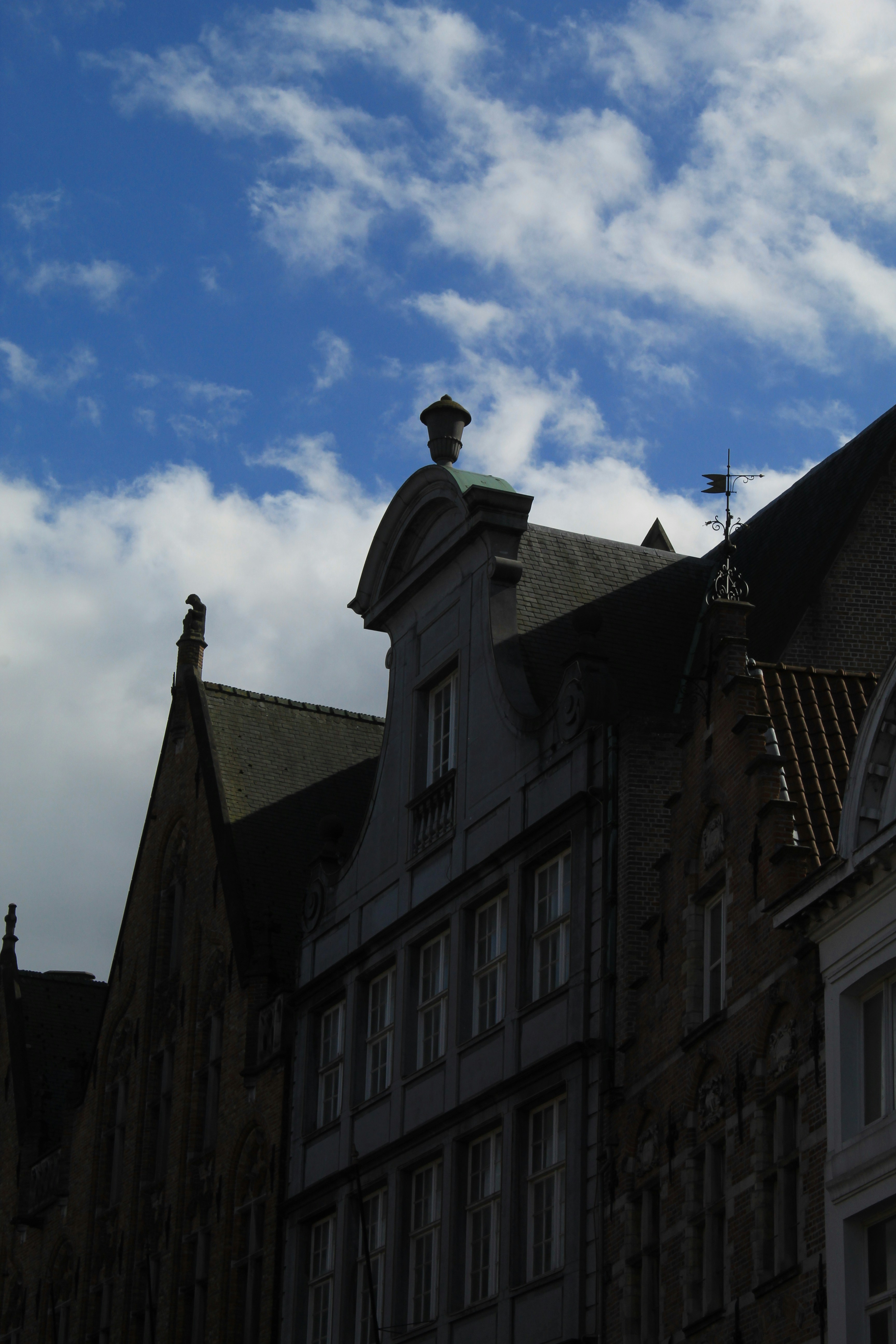 Gabled Facades under a Blue Sky