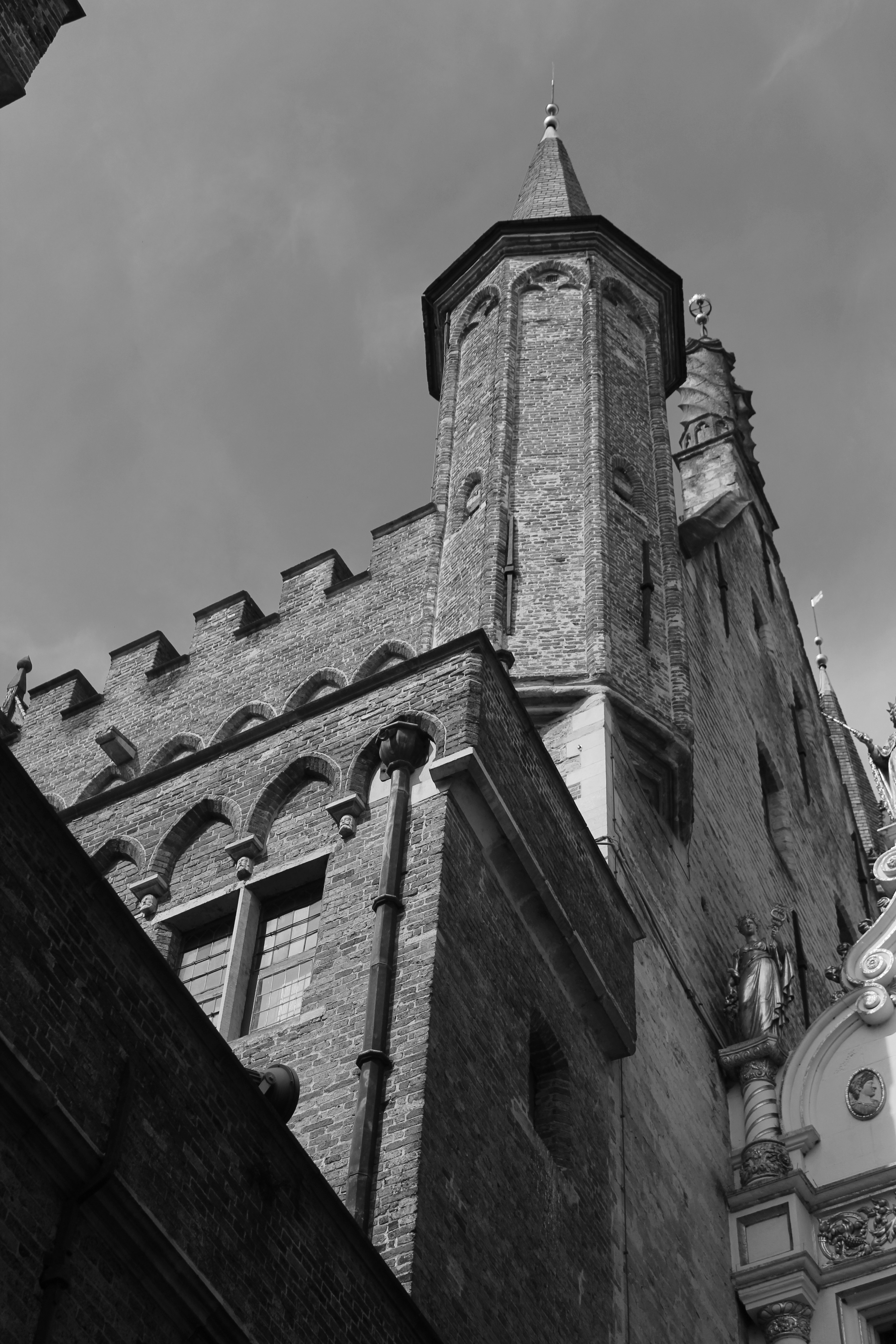 Gothic Turrets Rising Over Brick Facades