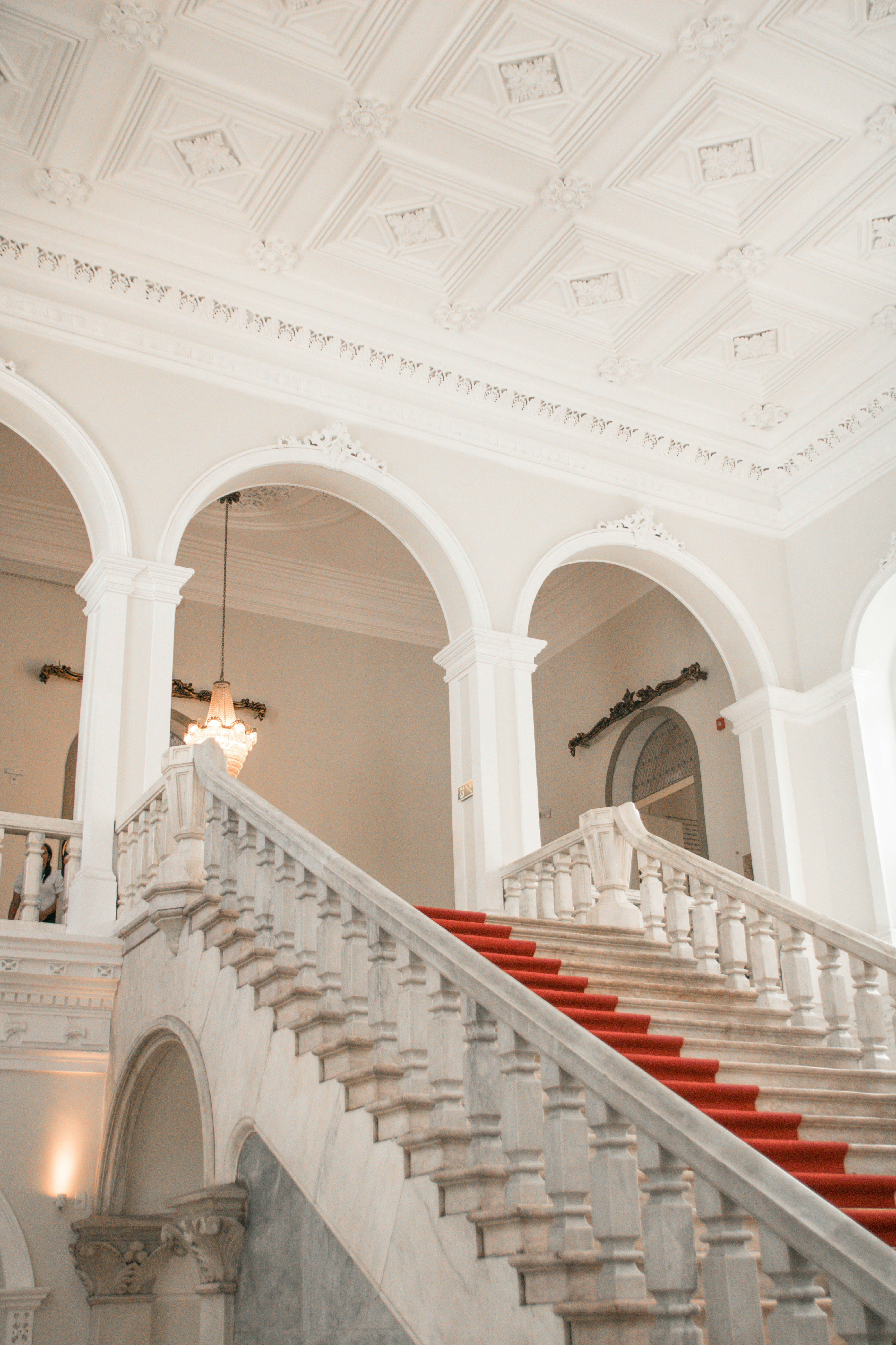 Grand Marble Staircase in an Elegant Arcaded Hall