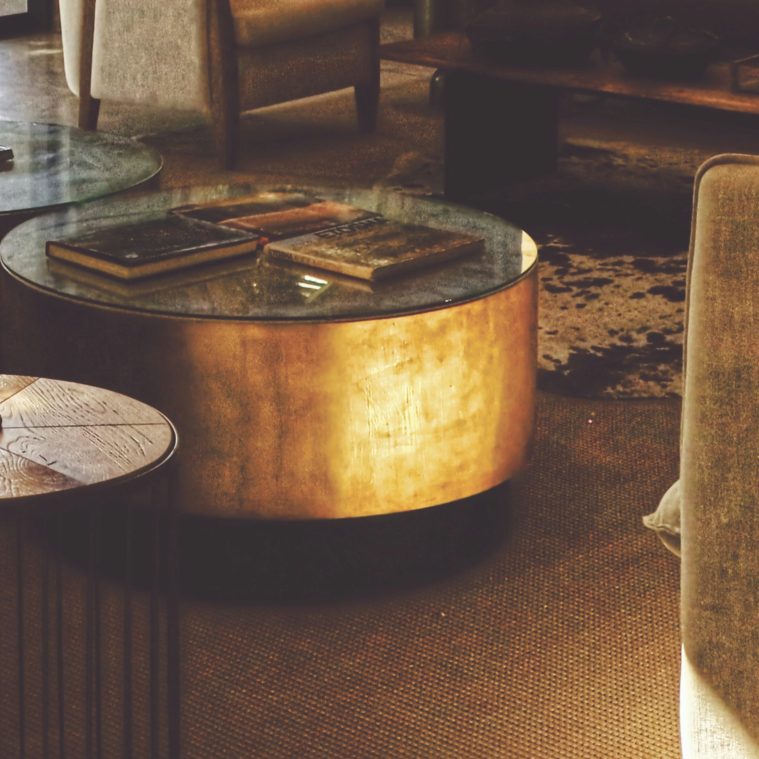 Amber glow over a cozy lounge: round coffee table scene