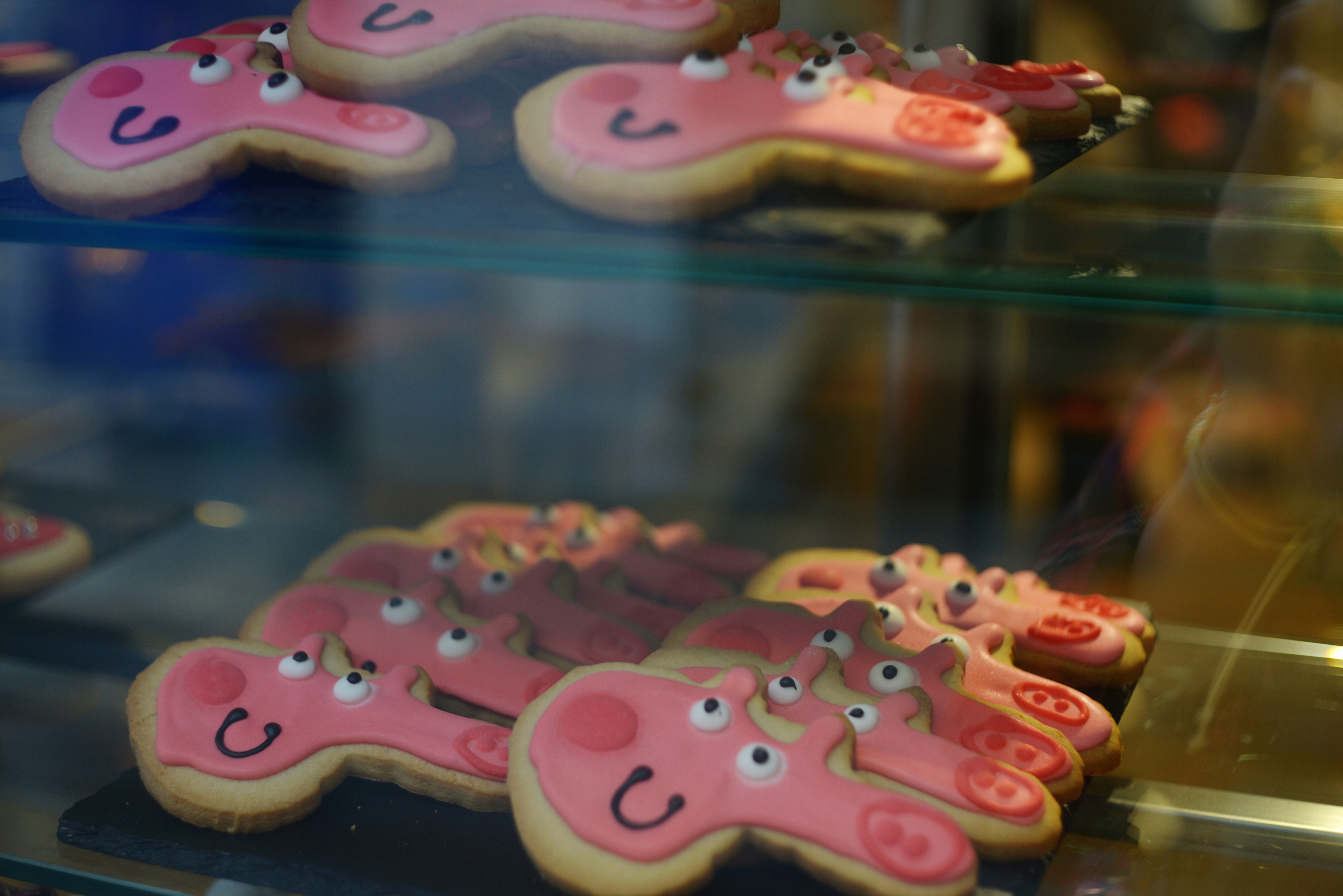 Sugary Cow Parade: Pink Cookies Behind Glass