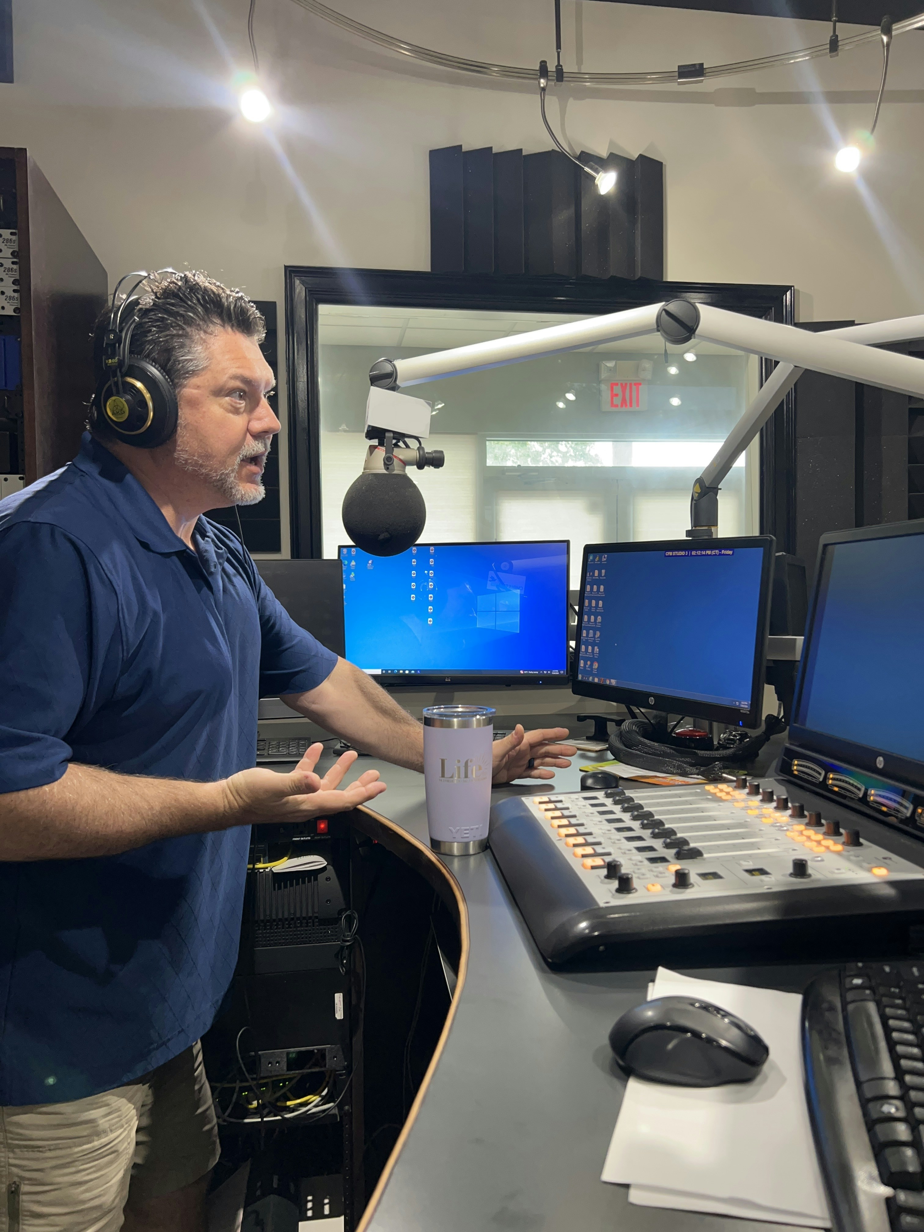 Radio Studio Conversation: A Broadcaster mid‑discussion