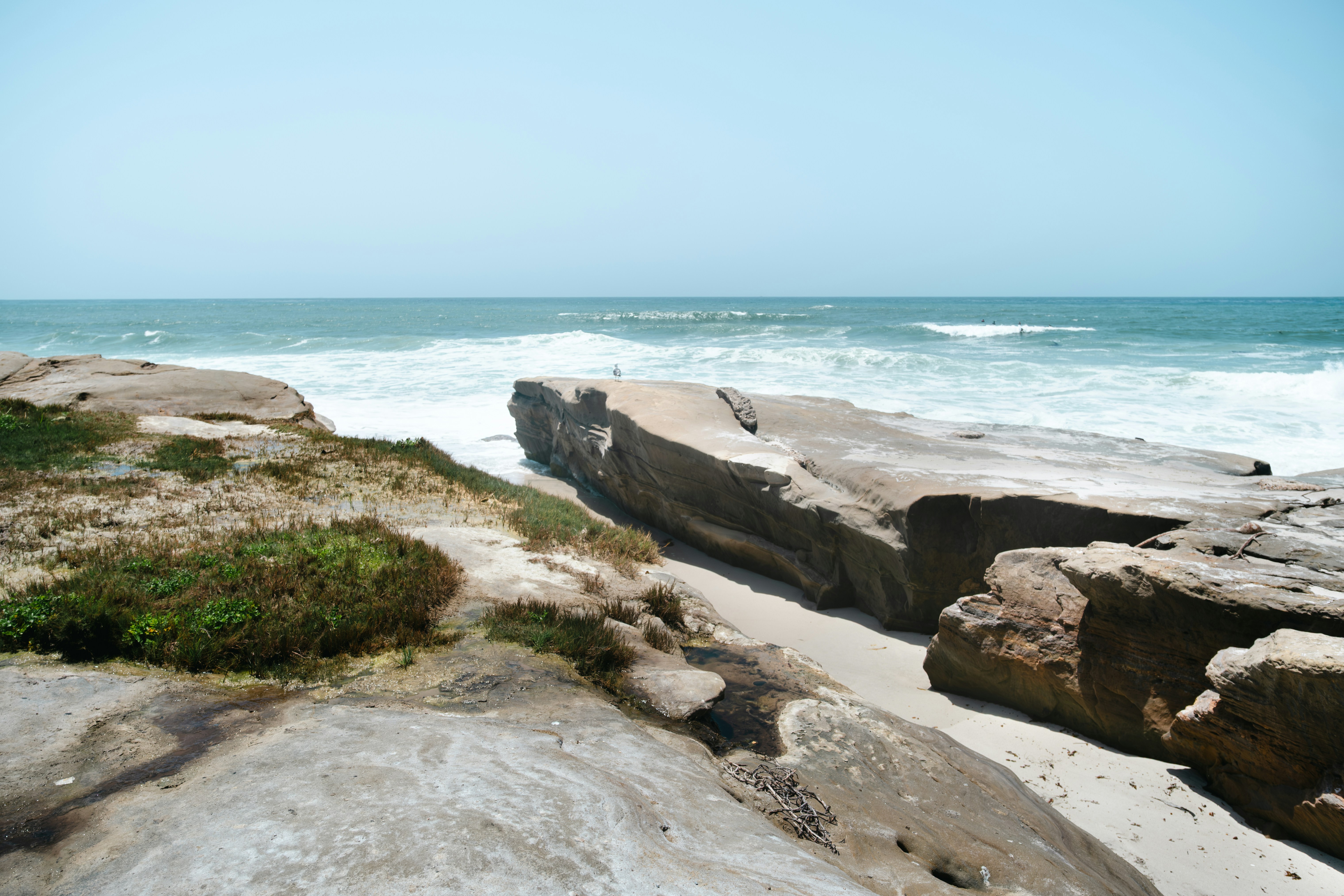 Coastal Carved Rocks Meet the Calm Horizon