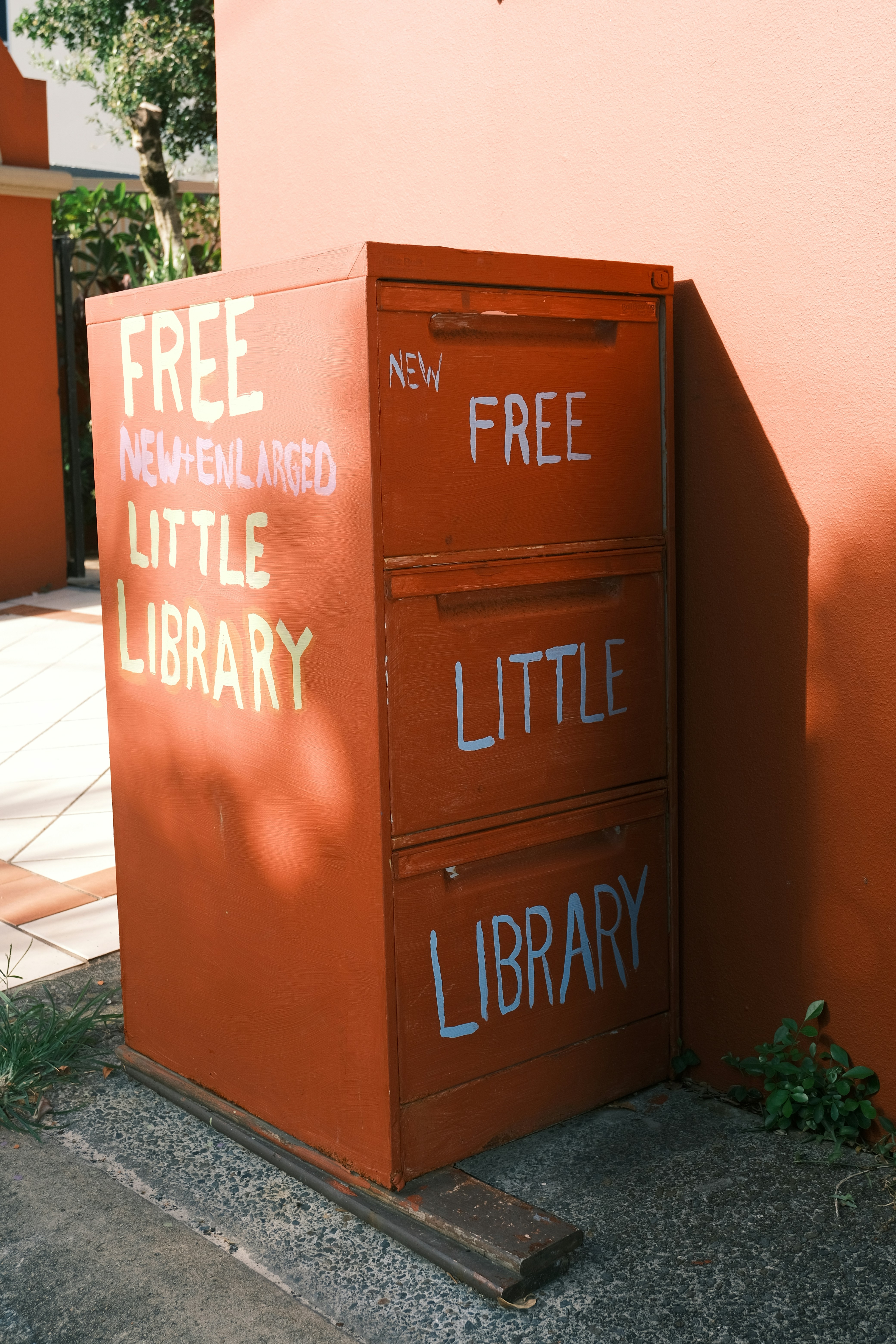 Free Library—A Rusty Mailbox with Bold Graffiti