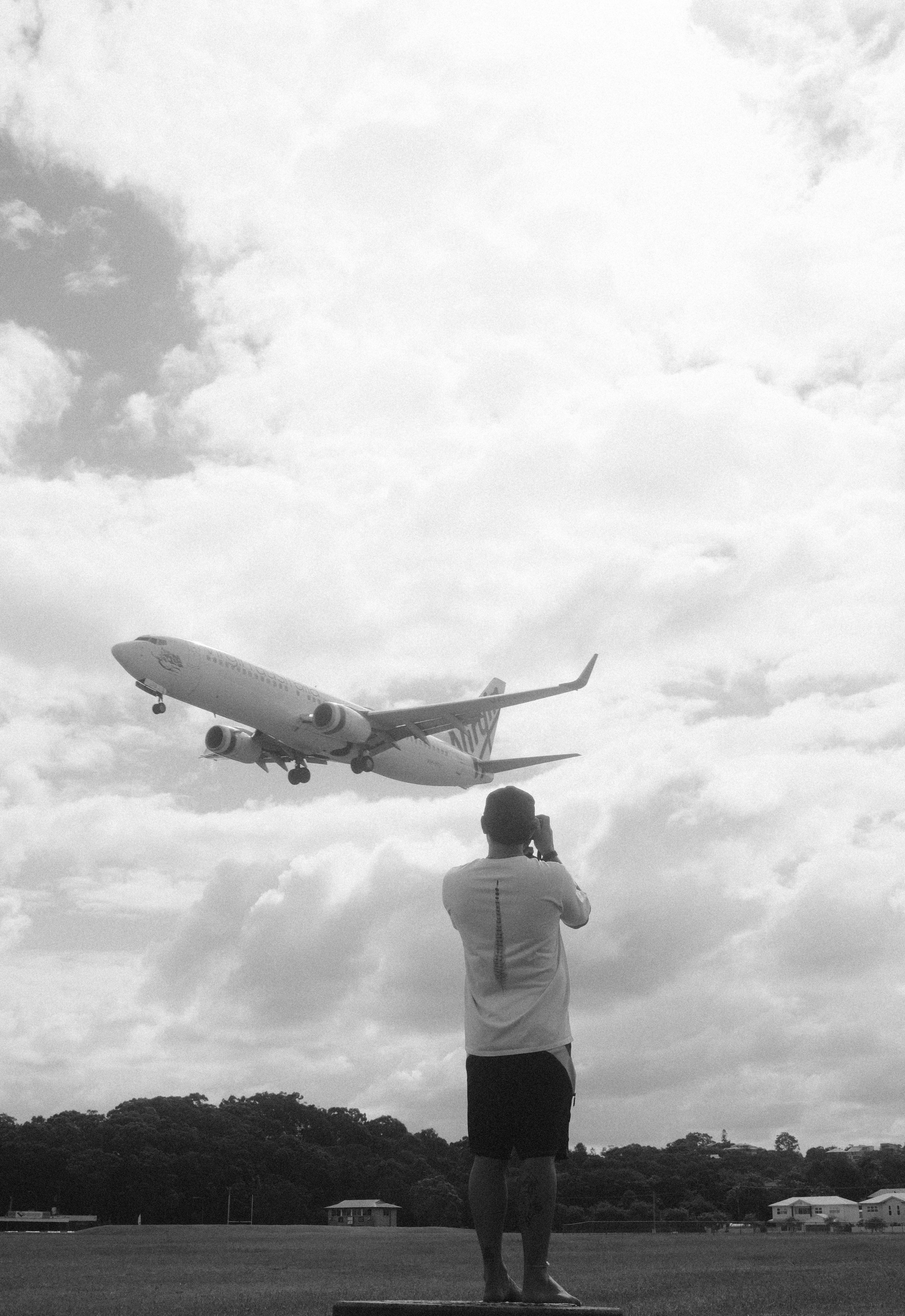 Skyward Moment: Photographer Captures Landing in an Open Field