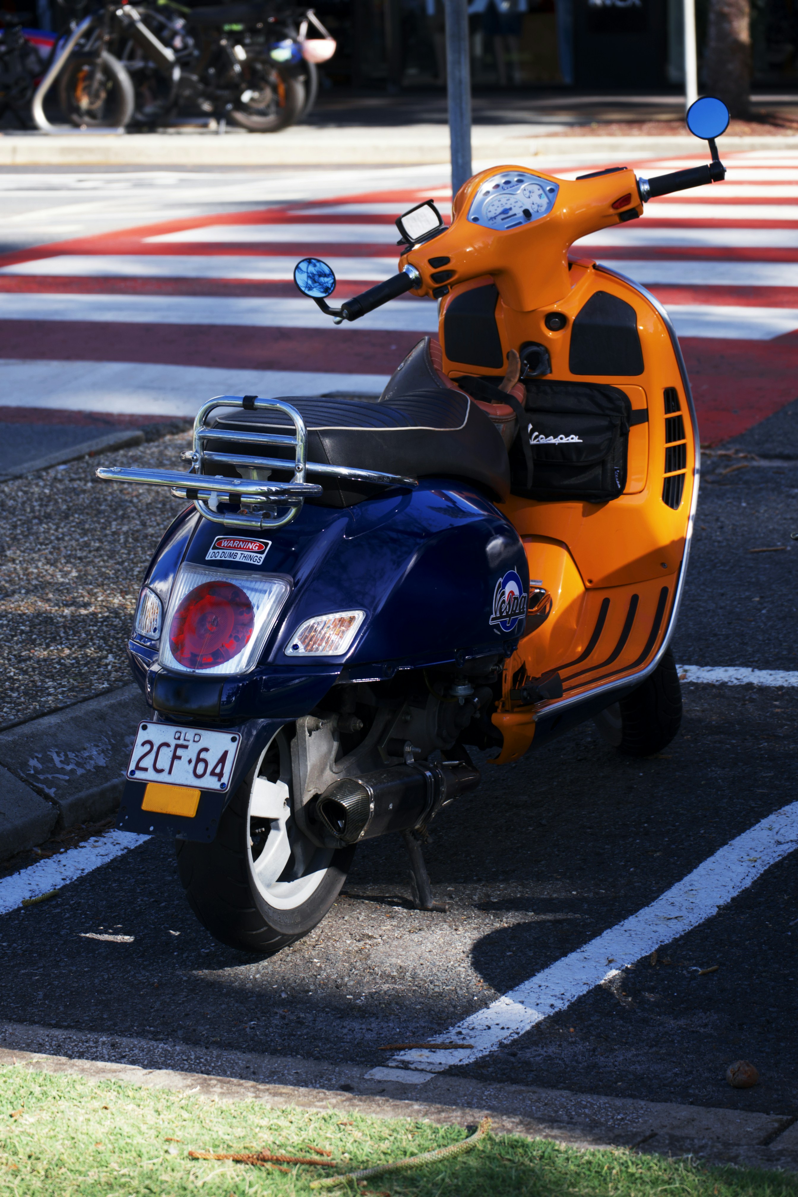 Orange Scooter as Street-Scene Accent