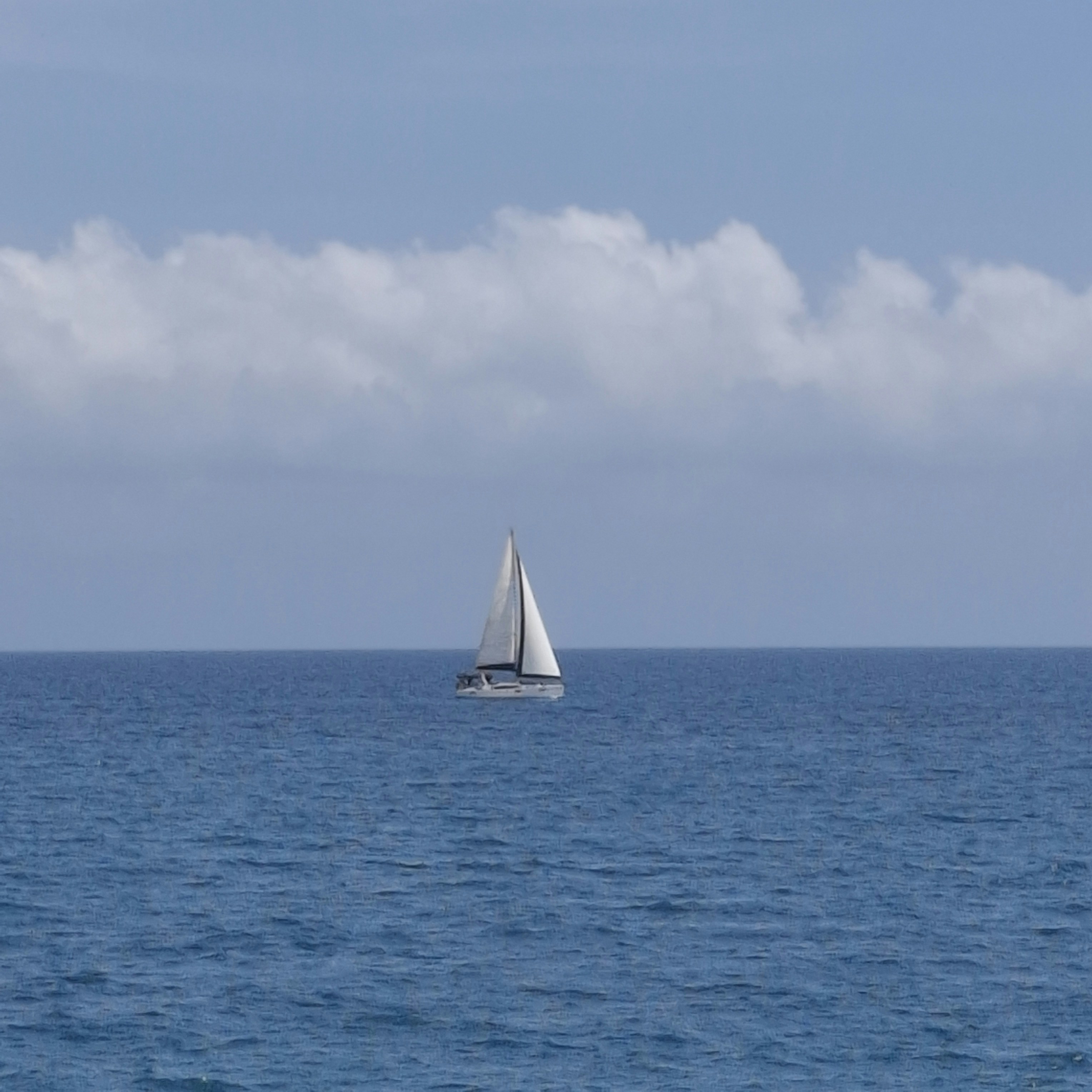 Sailboat at Distant Horizon
