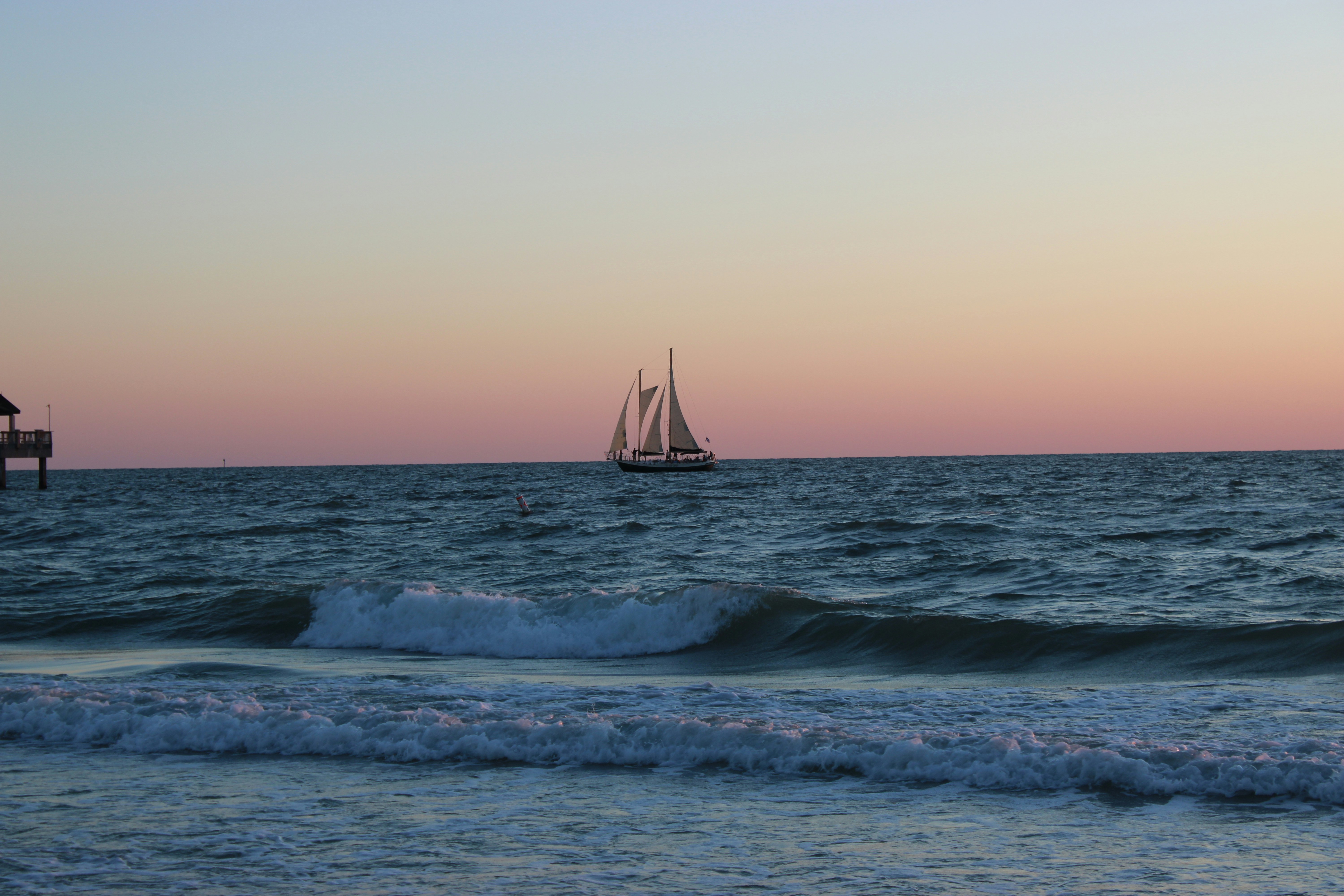 Sailboat at Dusk: A Quiet Maritime Horizon