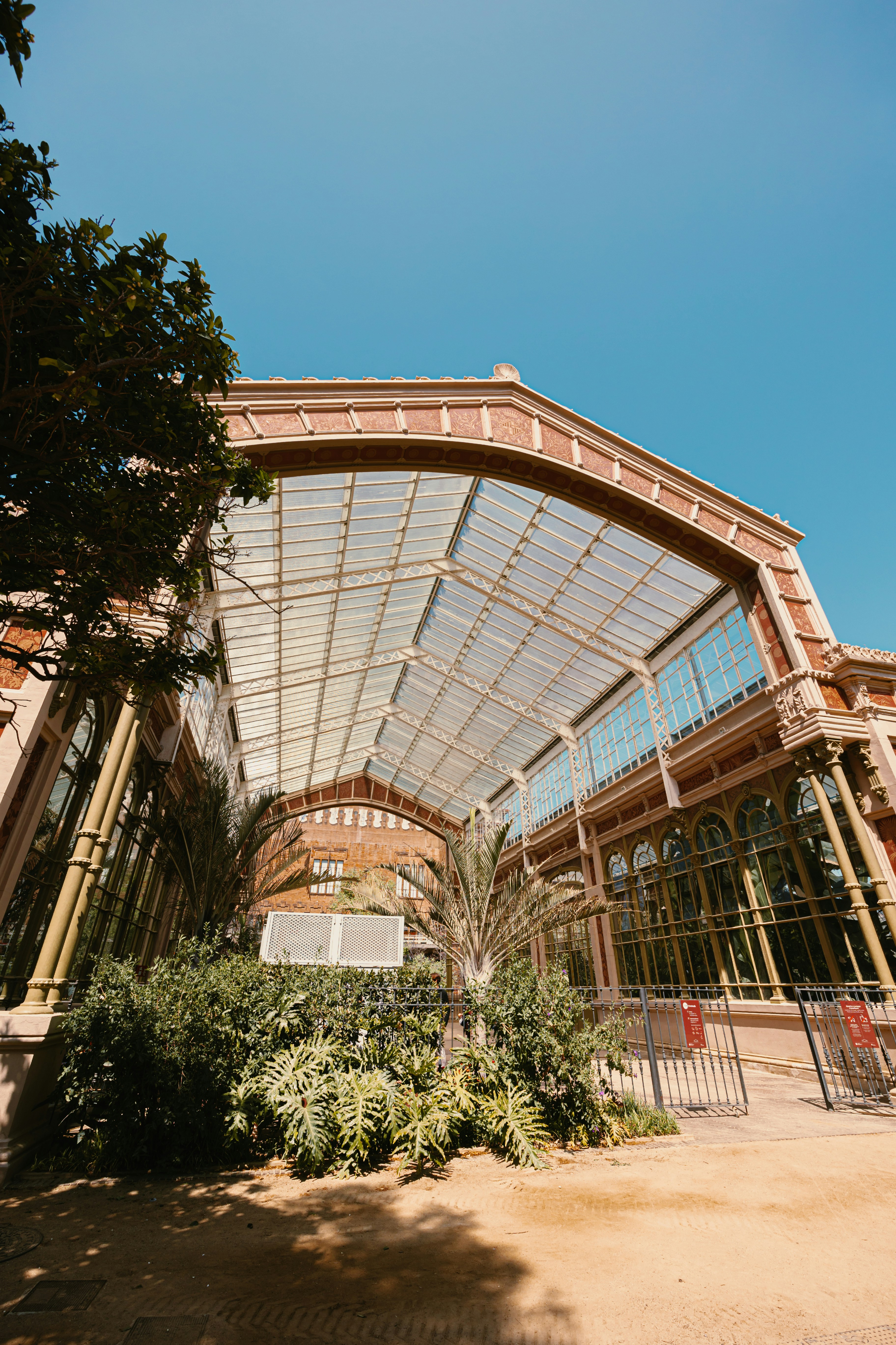 Glass Conservatory Under a Clear Sky