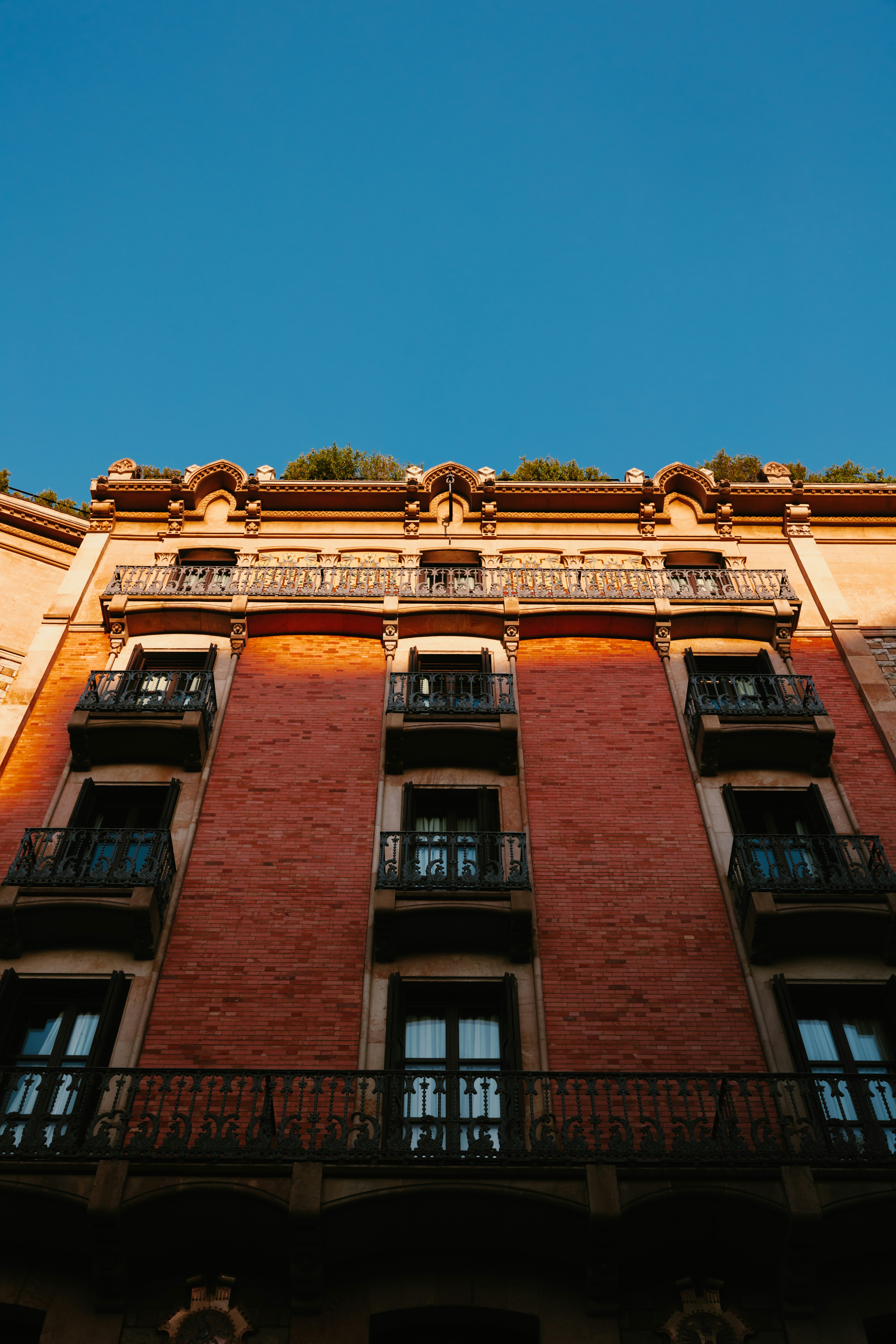 Brick Facade Gable: A Sunlit Urban Elevation