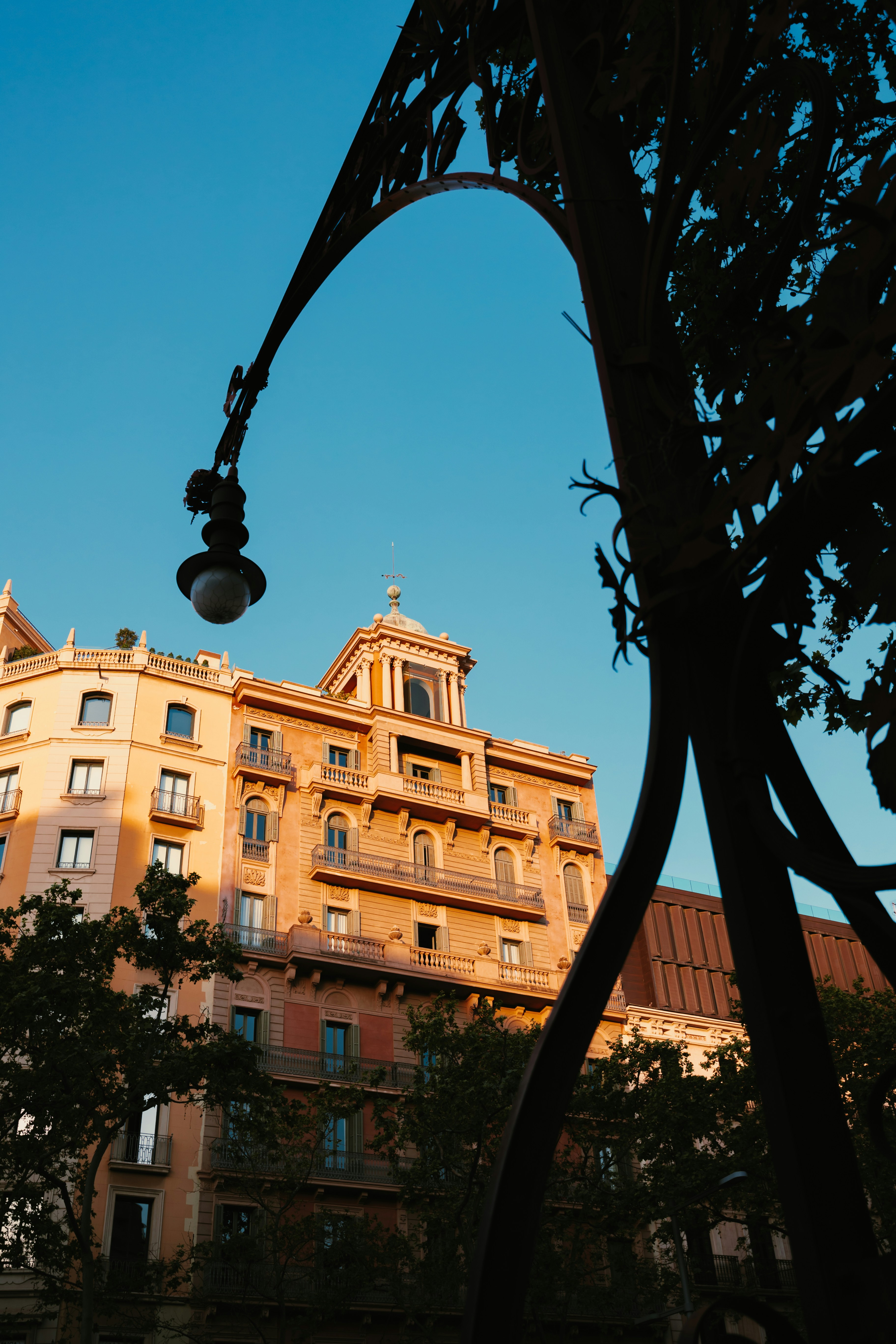 Golden Hour Facade: A Street-Corner Portrait in Warm Light