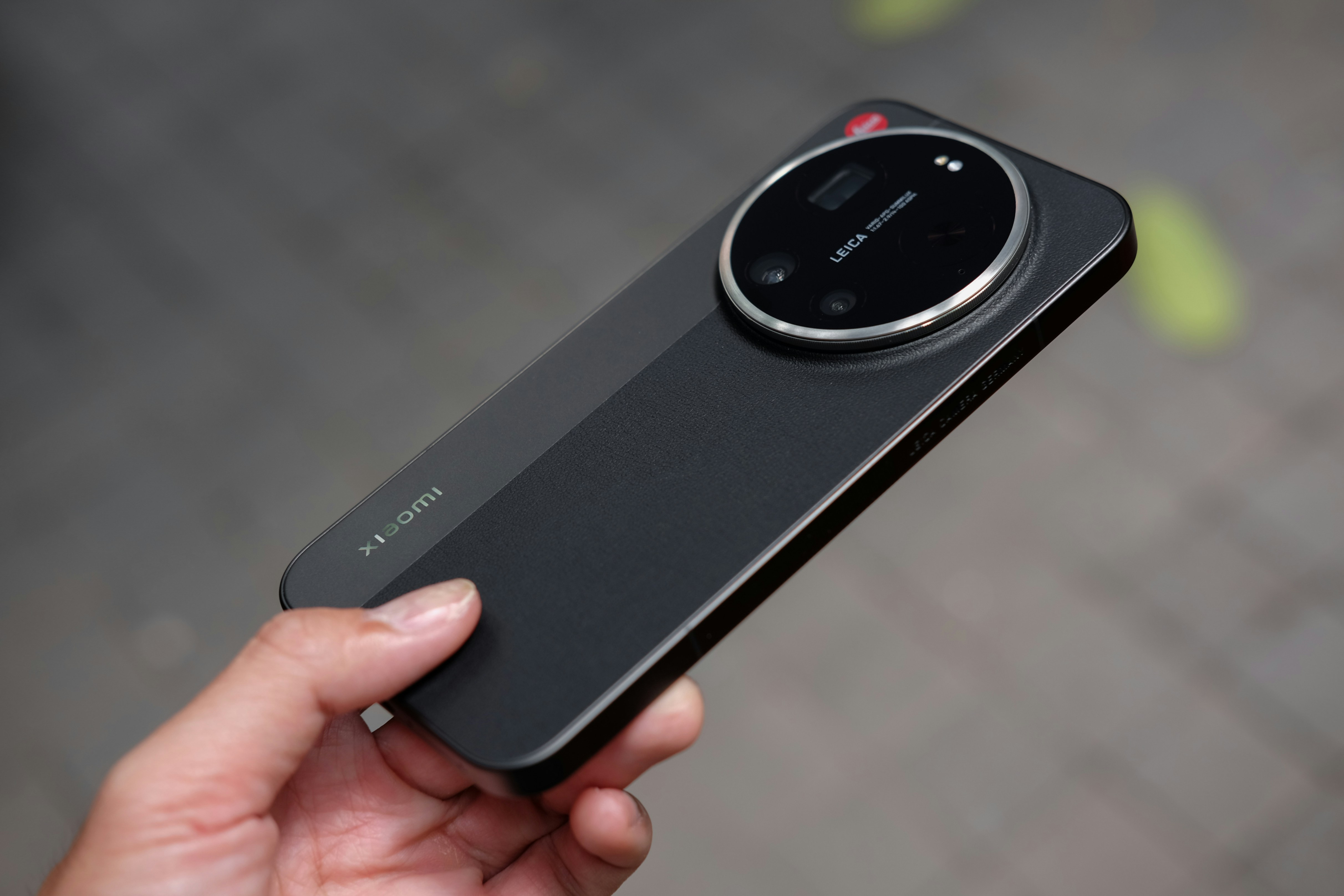 Holding Space-Gray: A Handful of Tech with a Circular Lens Pleat
