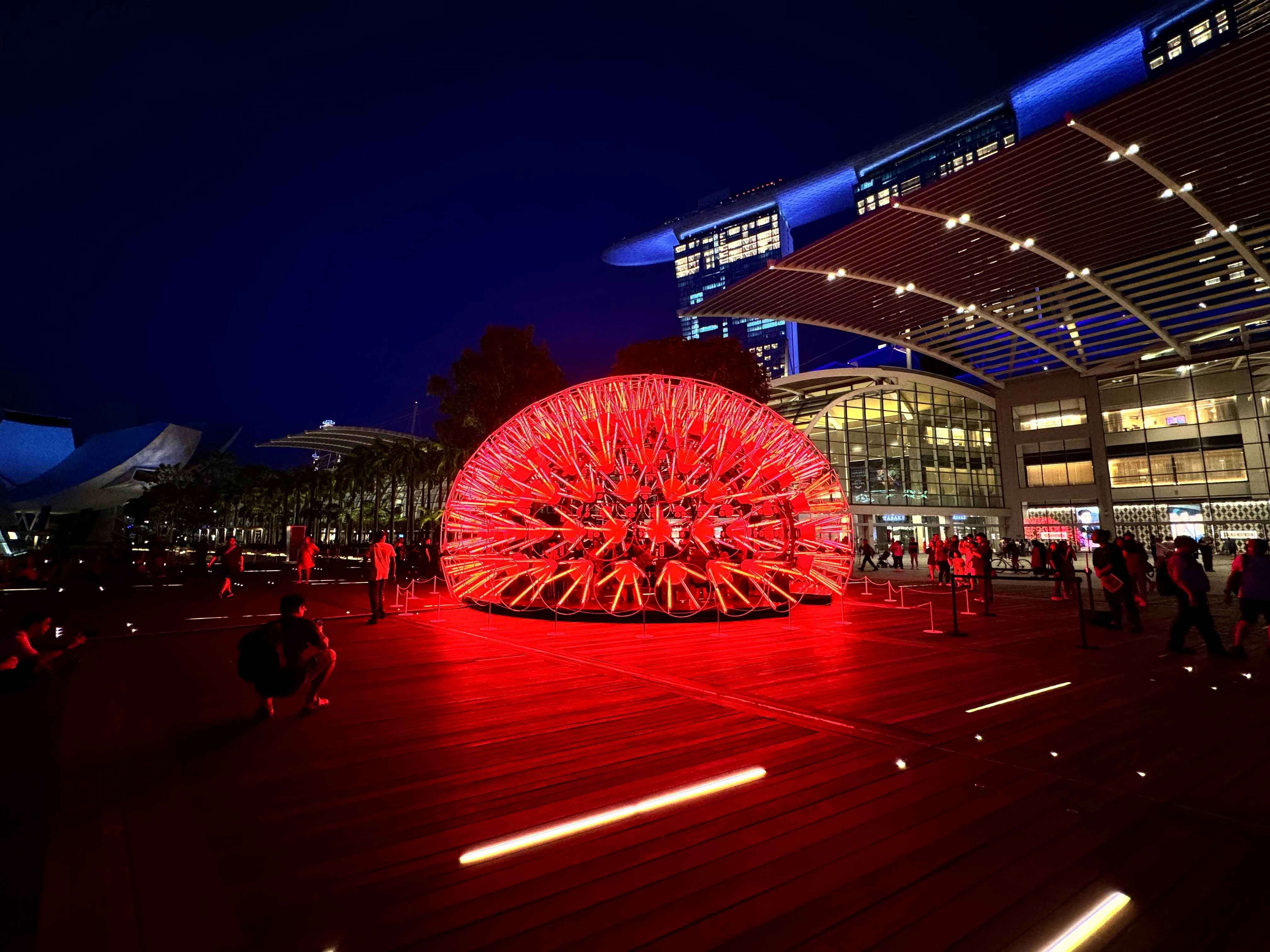 Red Orb Lights: A Public Plaza Immersed in Neon Circles