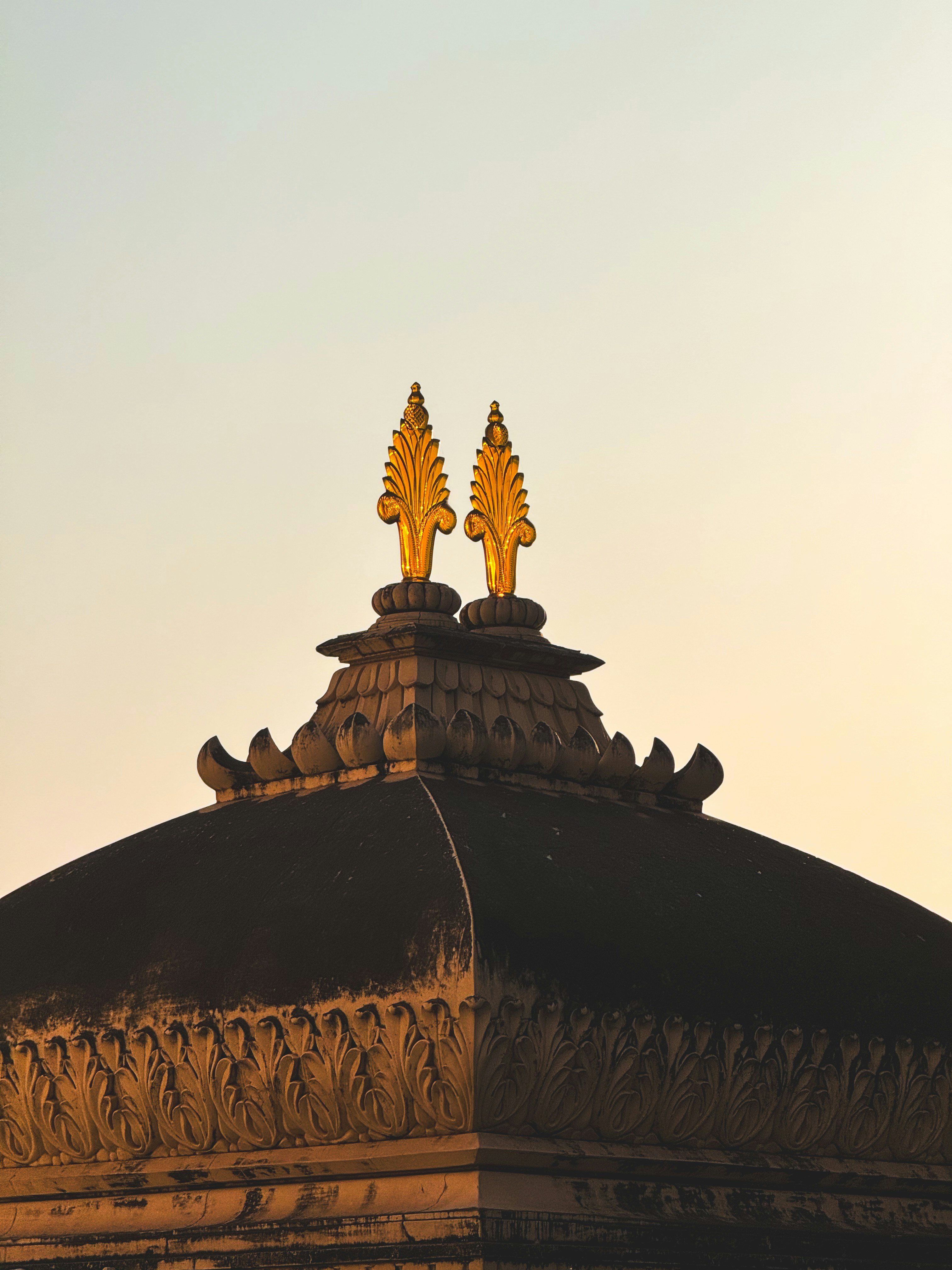 Golden Finials on a Silent Dome at Sunset