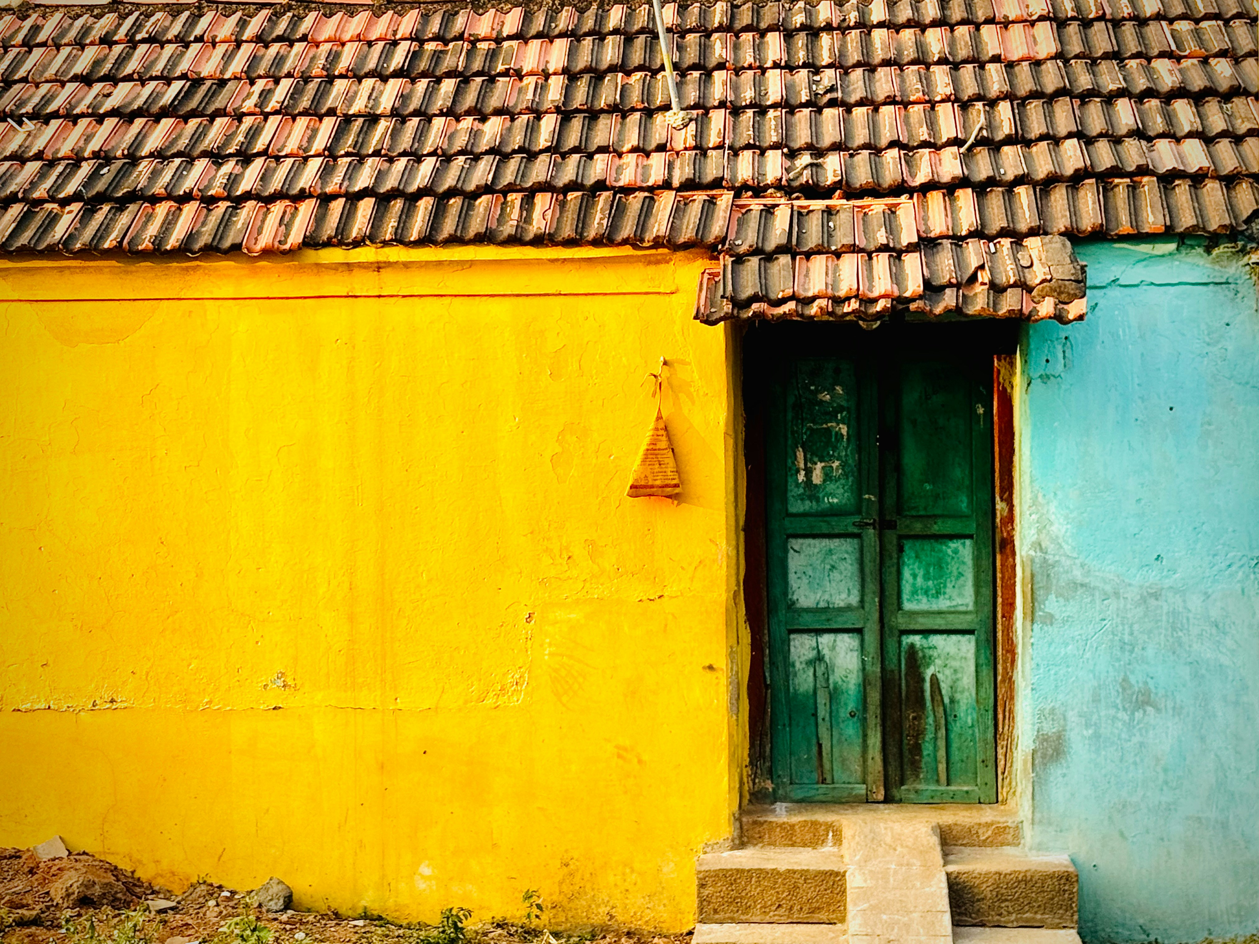 Sunlit Doorway Between Bold Colors
