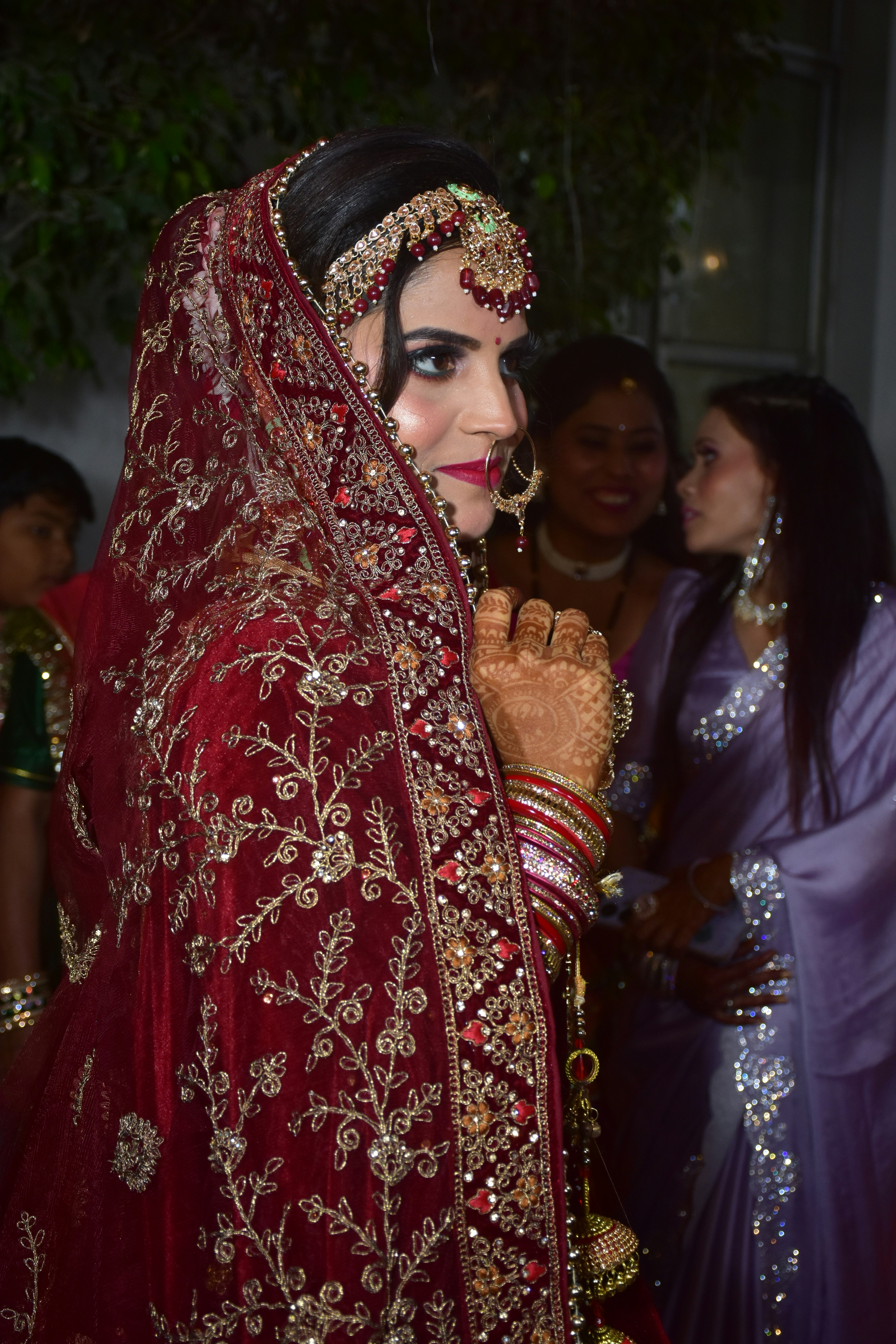 Red Veil of Celebration: Portrait of a Bride in Embroidered Silk