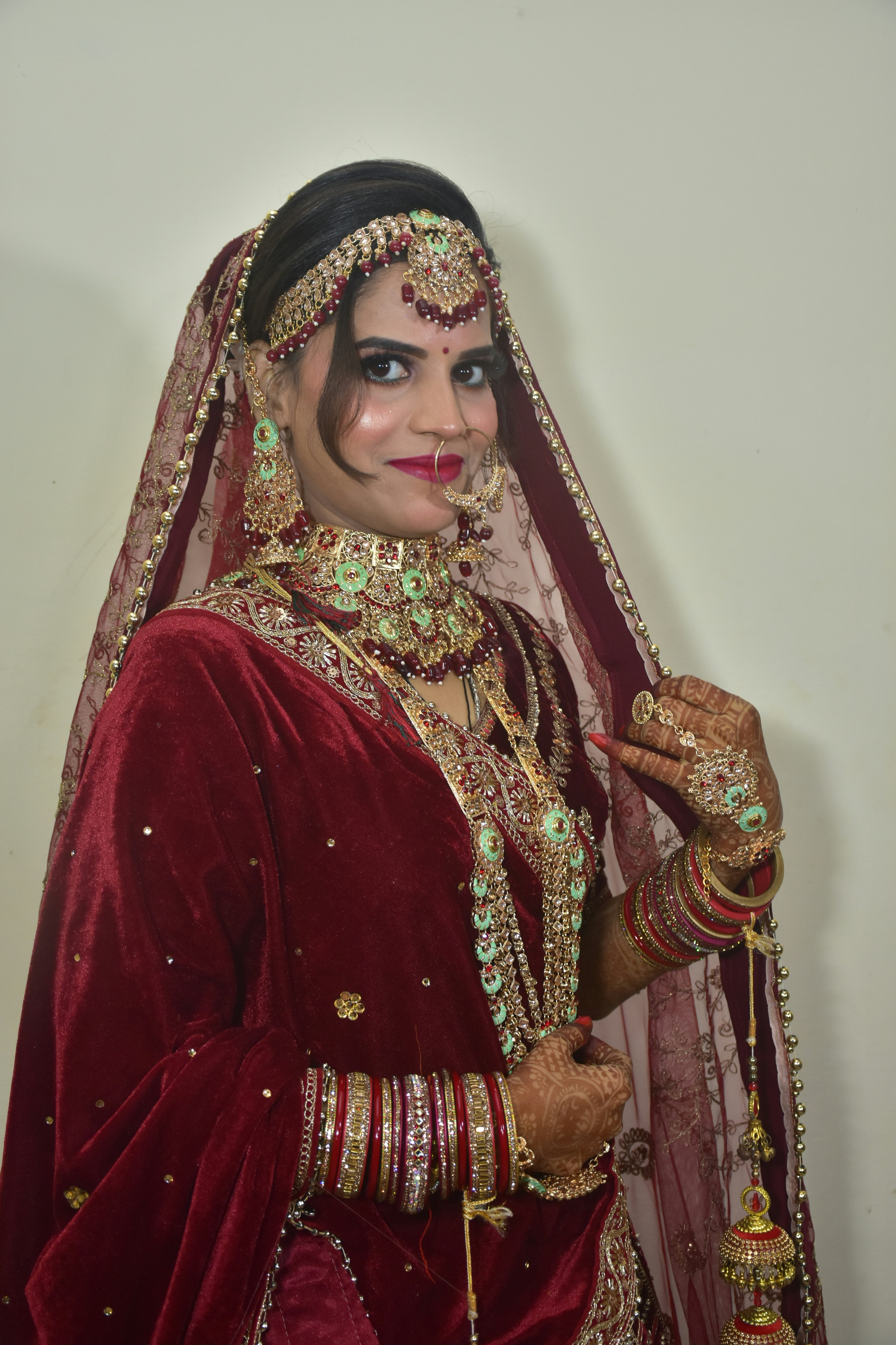 Emerald Veil: Bride Adorned in Velvet Red