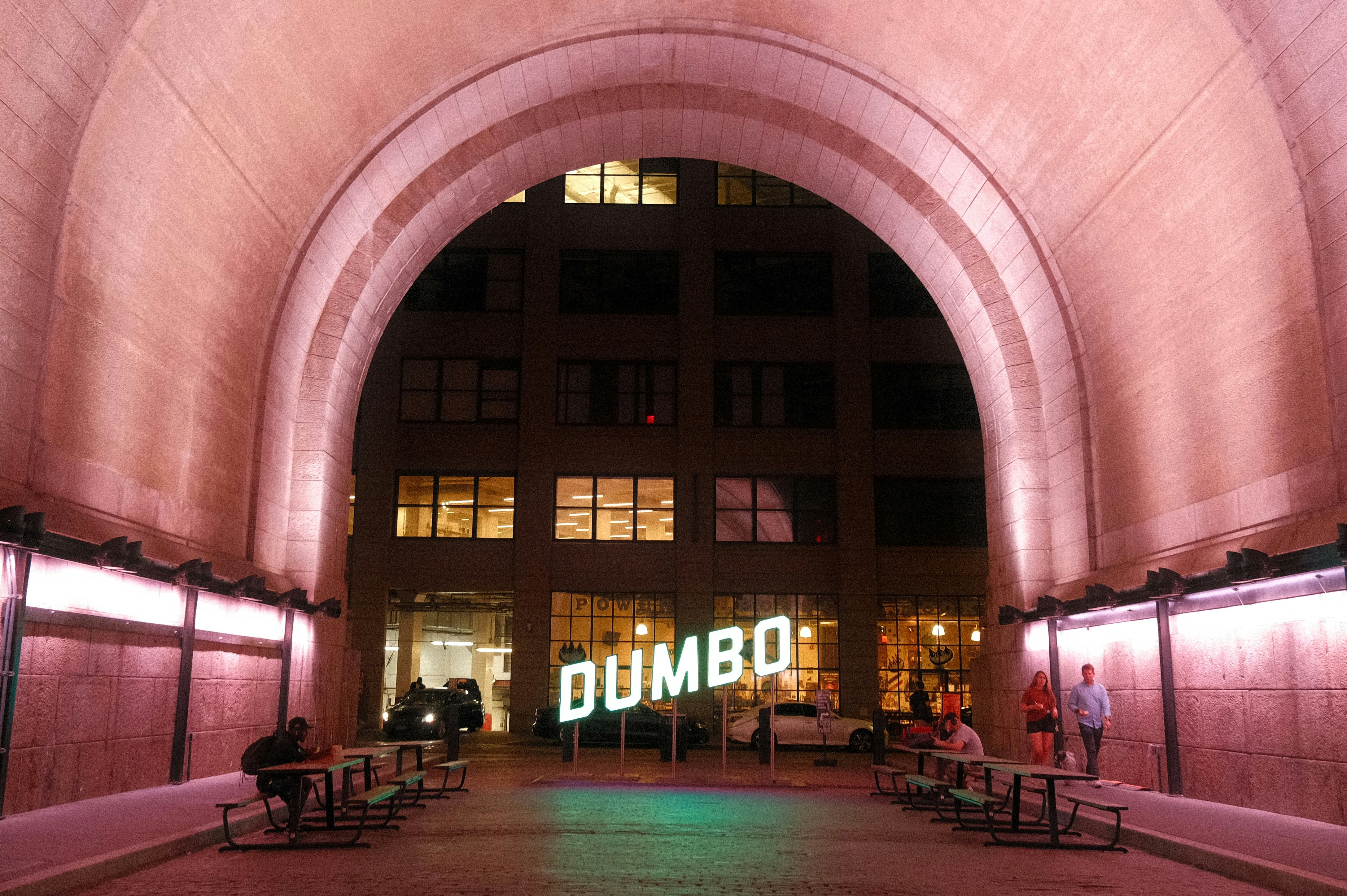 Dumbo Under Arch: Neon Welcome at Twilight