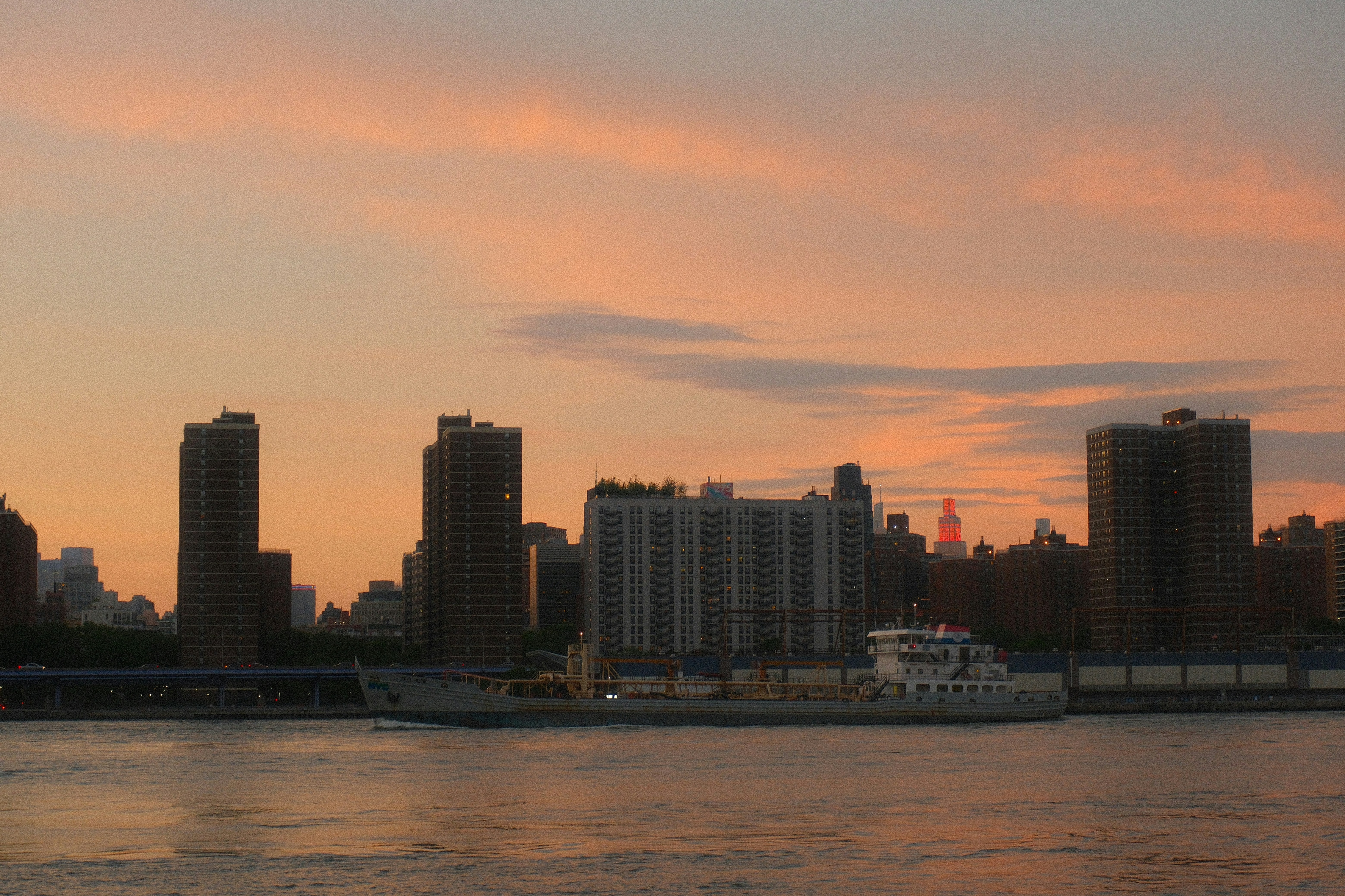 River Sunset Over City Silhouette