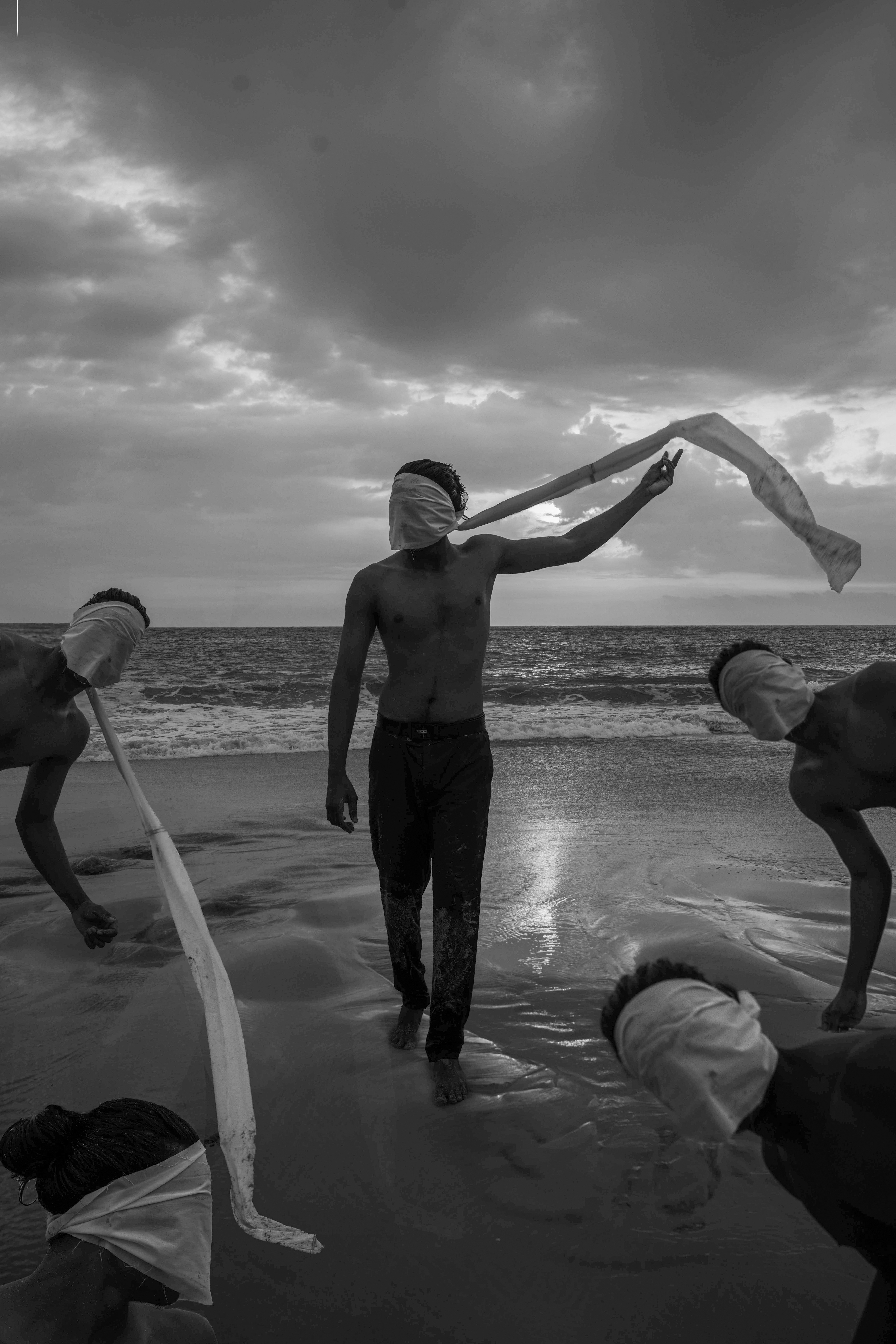 The Silent Conductor: A Group's Quiet Ritual on a Briny Stage