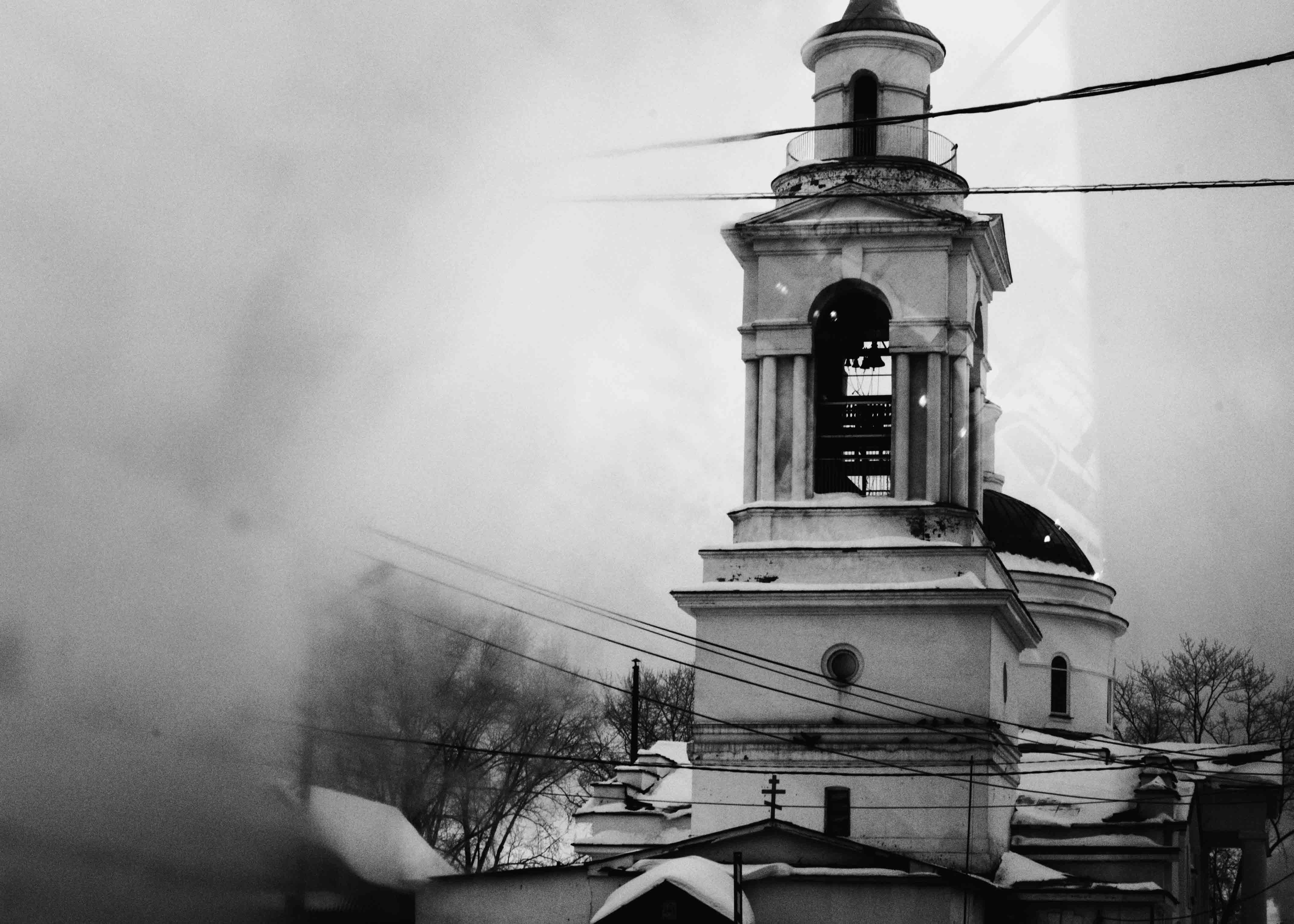 Bell Tower in Smoke and Silence