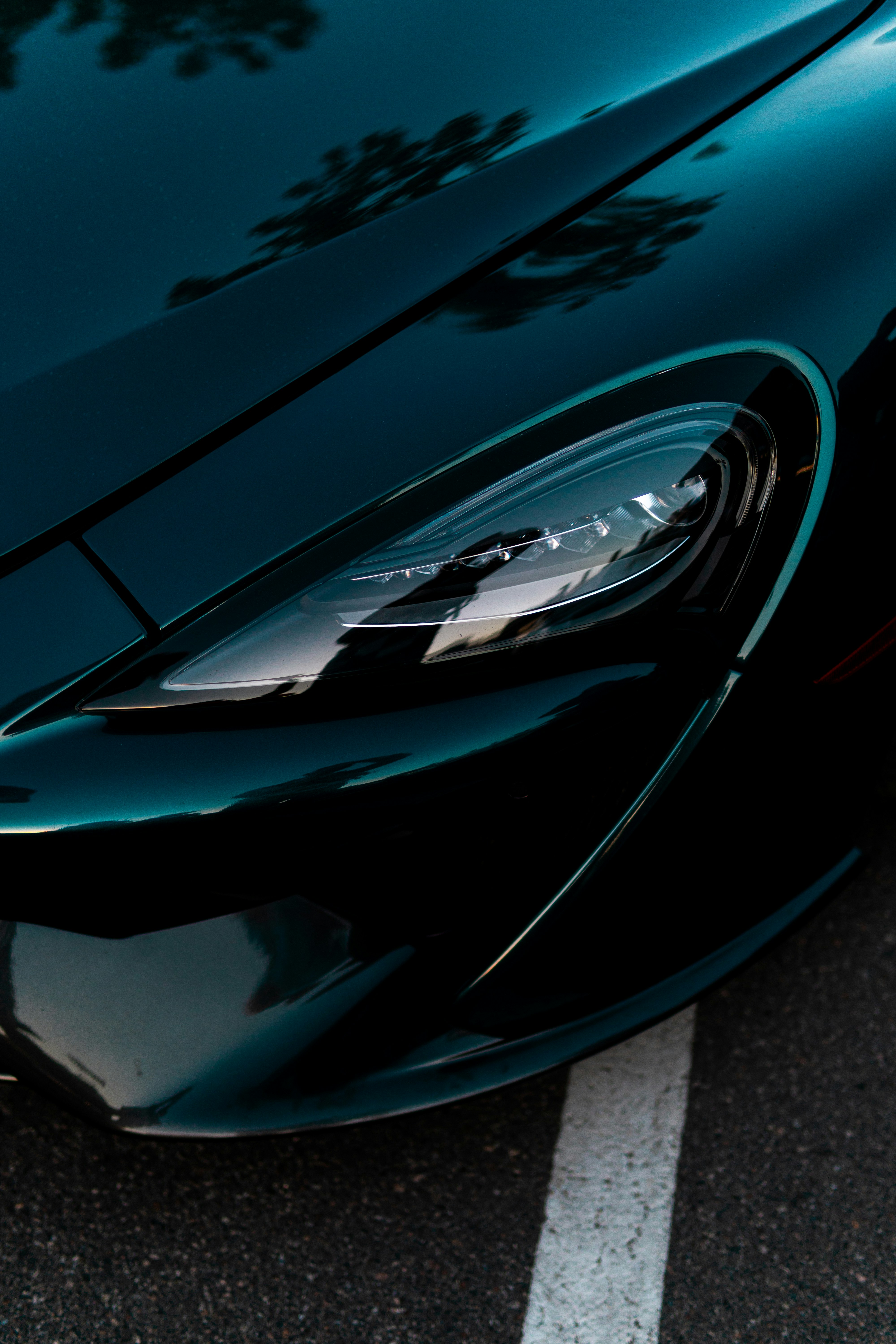 Teal Sleek: The Car's Eye in Sharp Focus