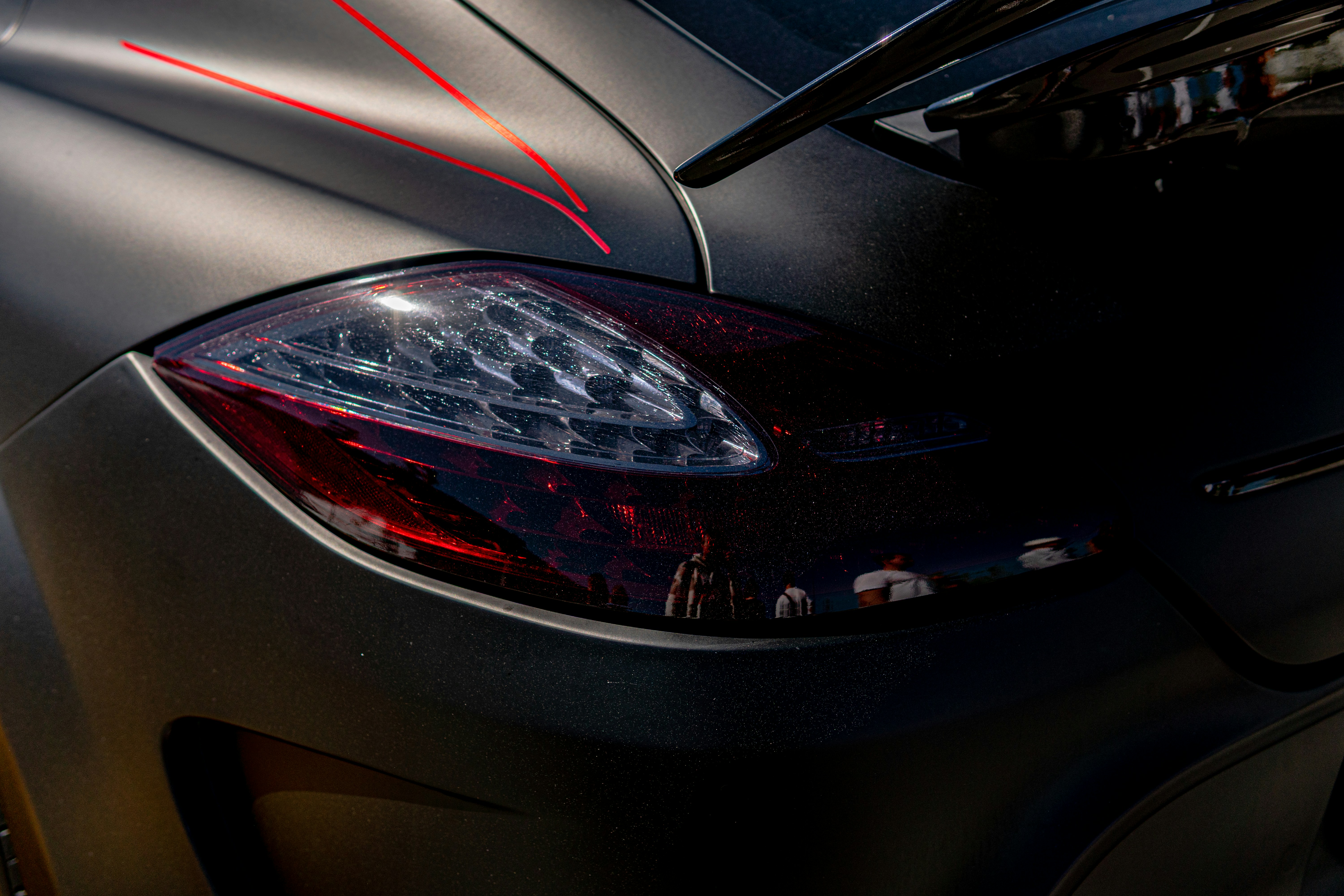 Matte Midnight Tail Light: A Car's Hidden Shadow
