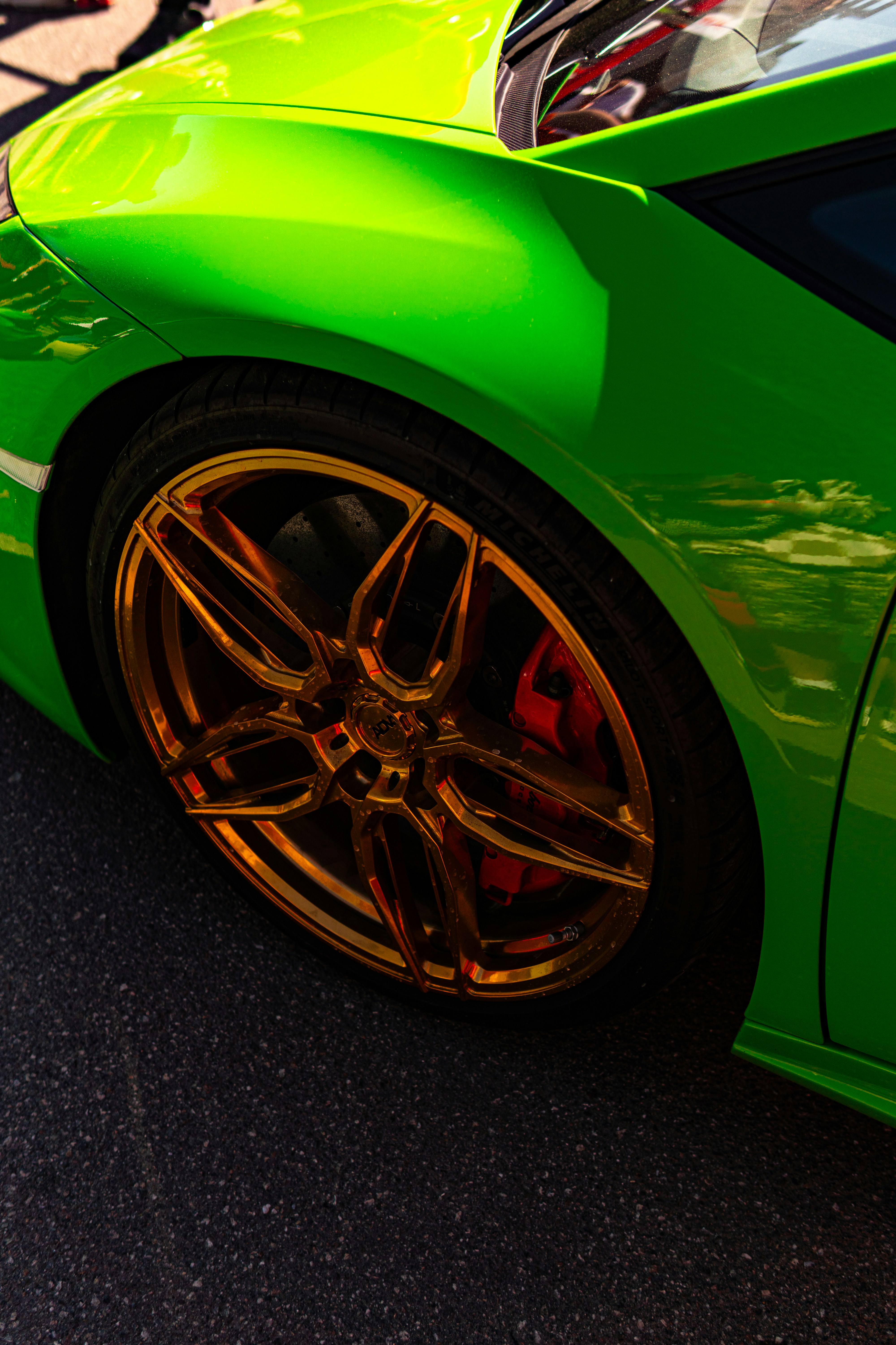 Lime Lightning: Gold-Wle Wheel on a Neon Green Beast