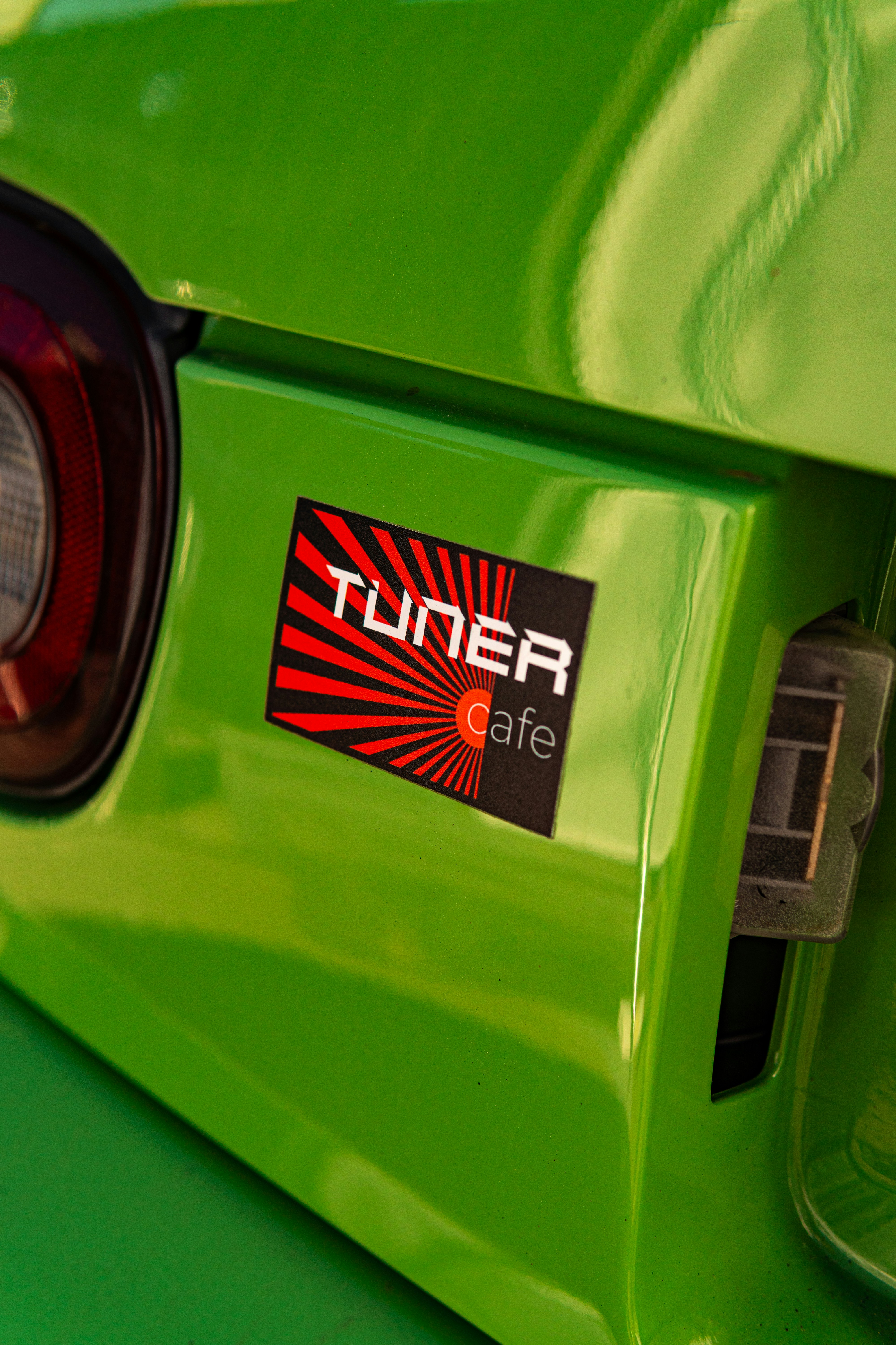 Green Apron, Red Gear: The Tuned Car Sticker Moment
