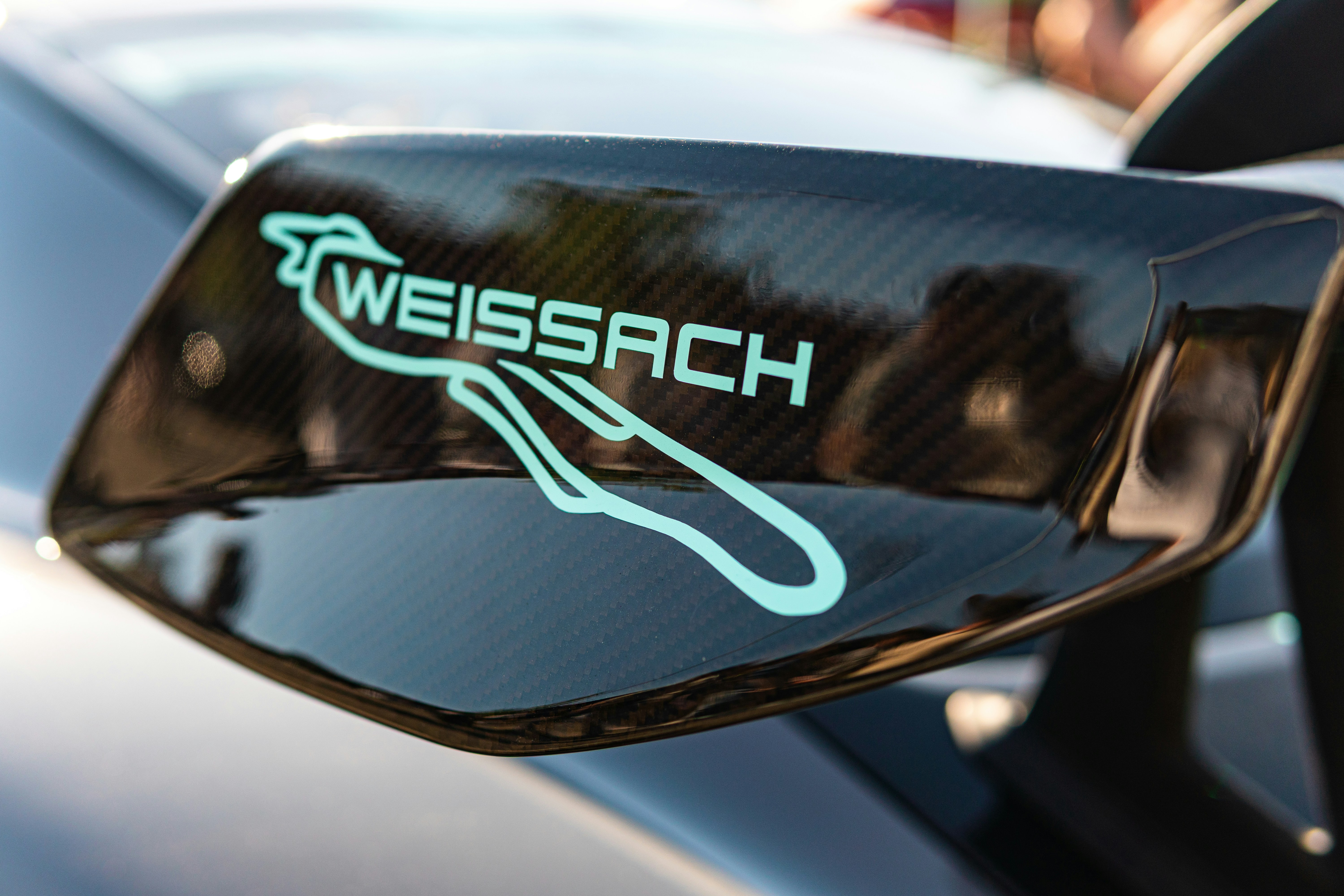 Weissach Wing Emblem: A Glossy Shadow of Speed