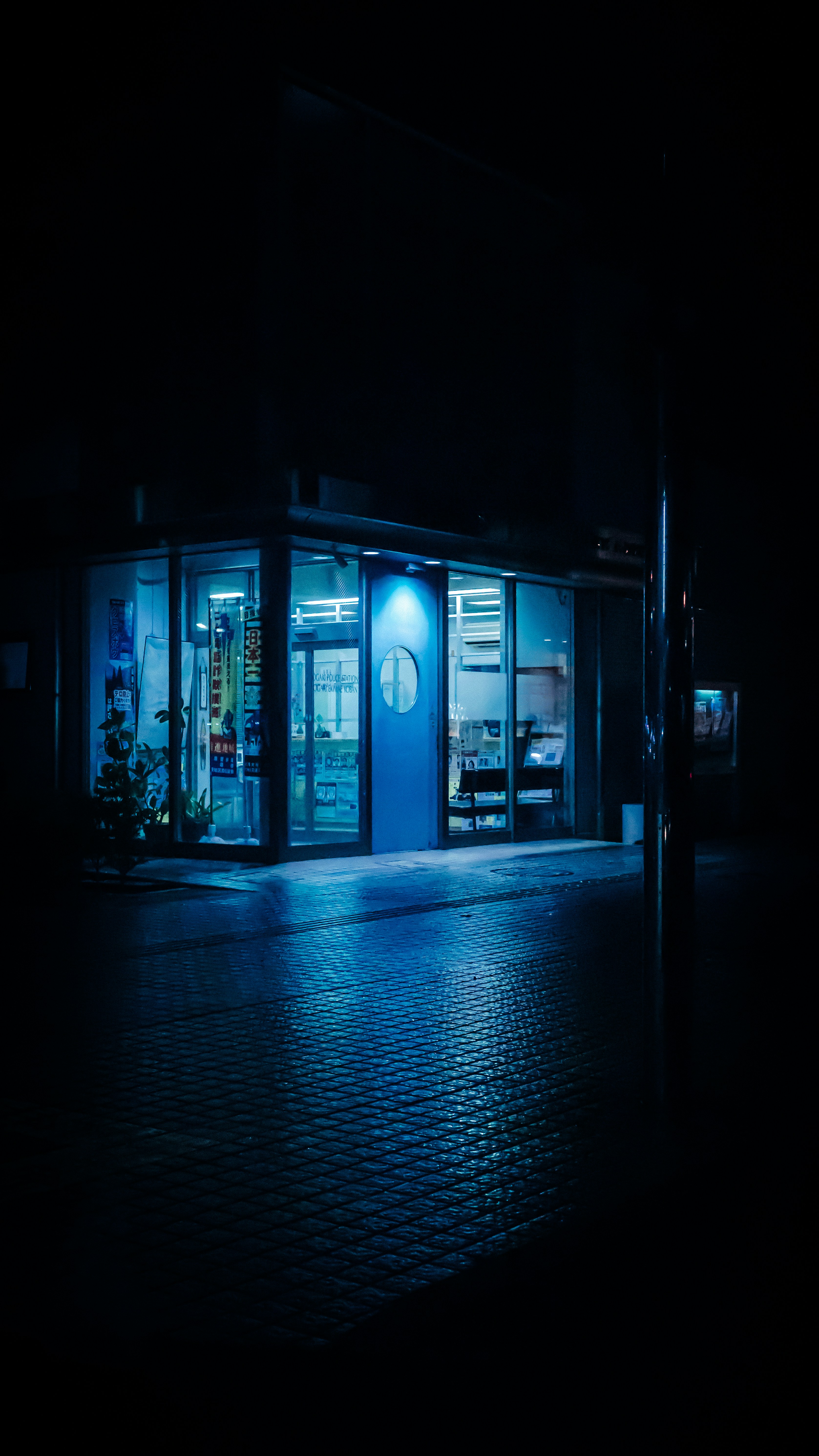 Blue Neon Corner: Quiet Convenience at Night