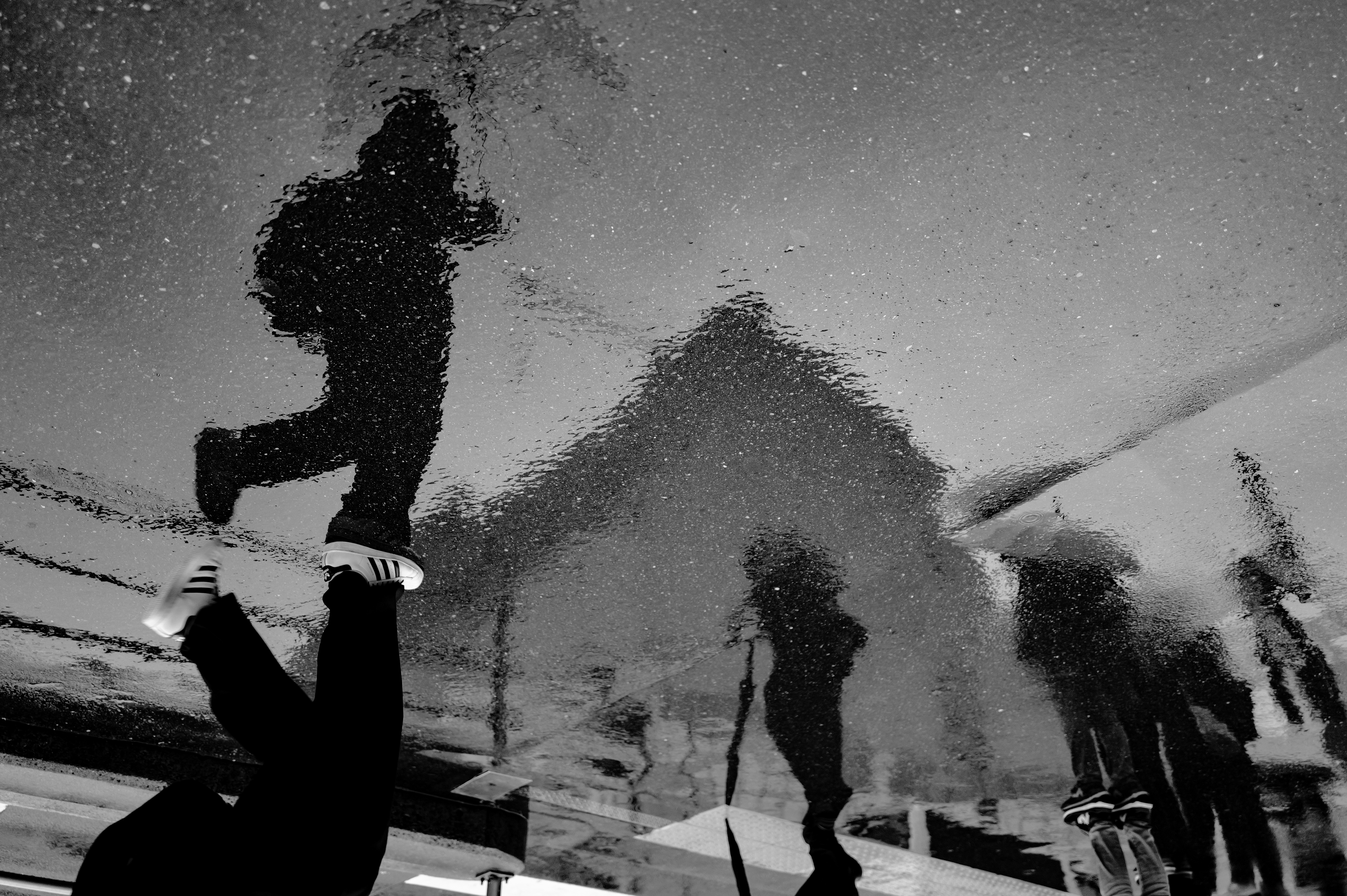 Shadow Dancers in a Moonlit Alley Reflections