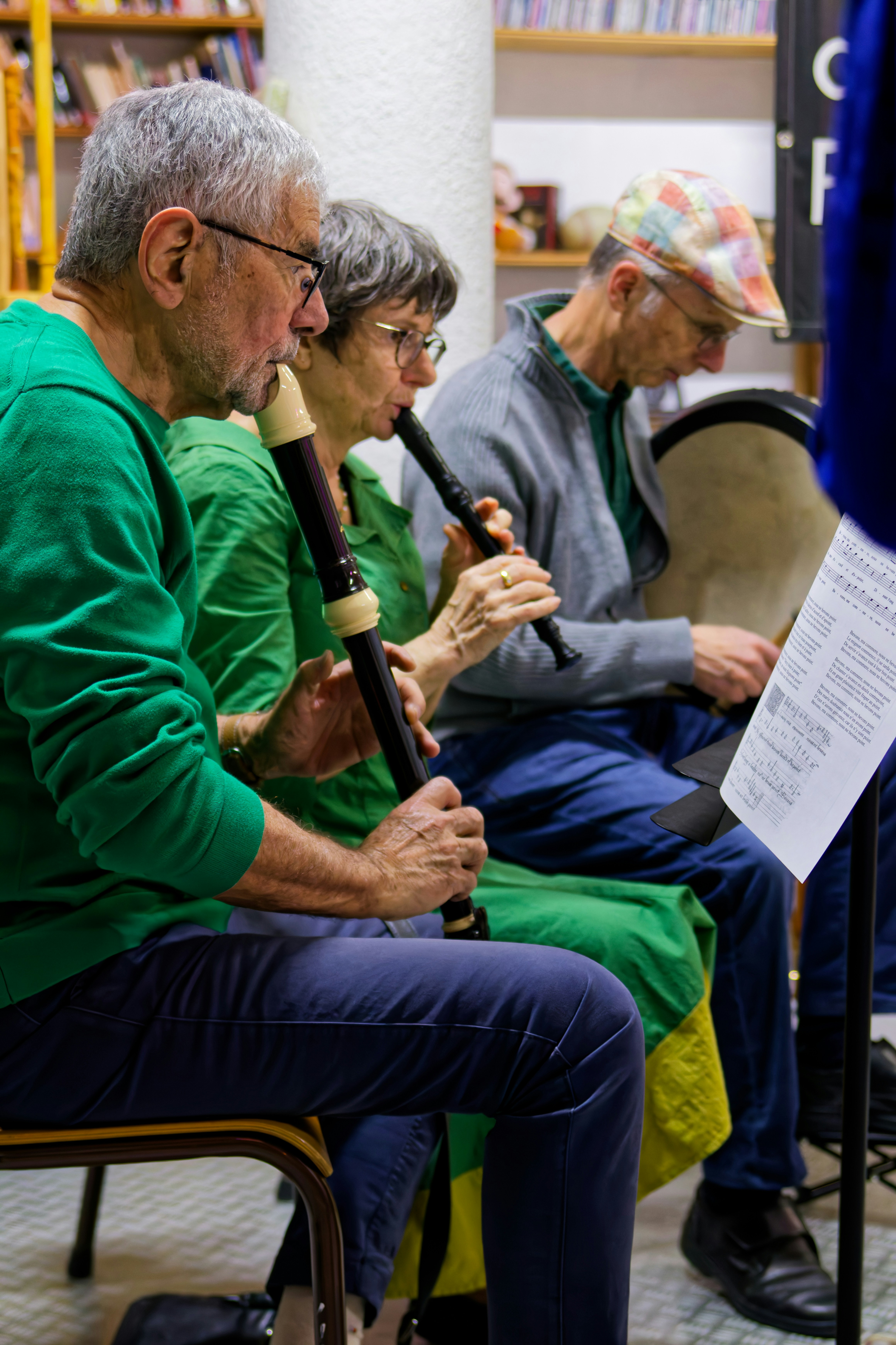 Three Clarinetists in a Cozy Library Session