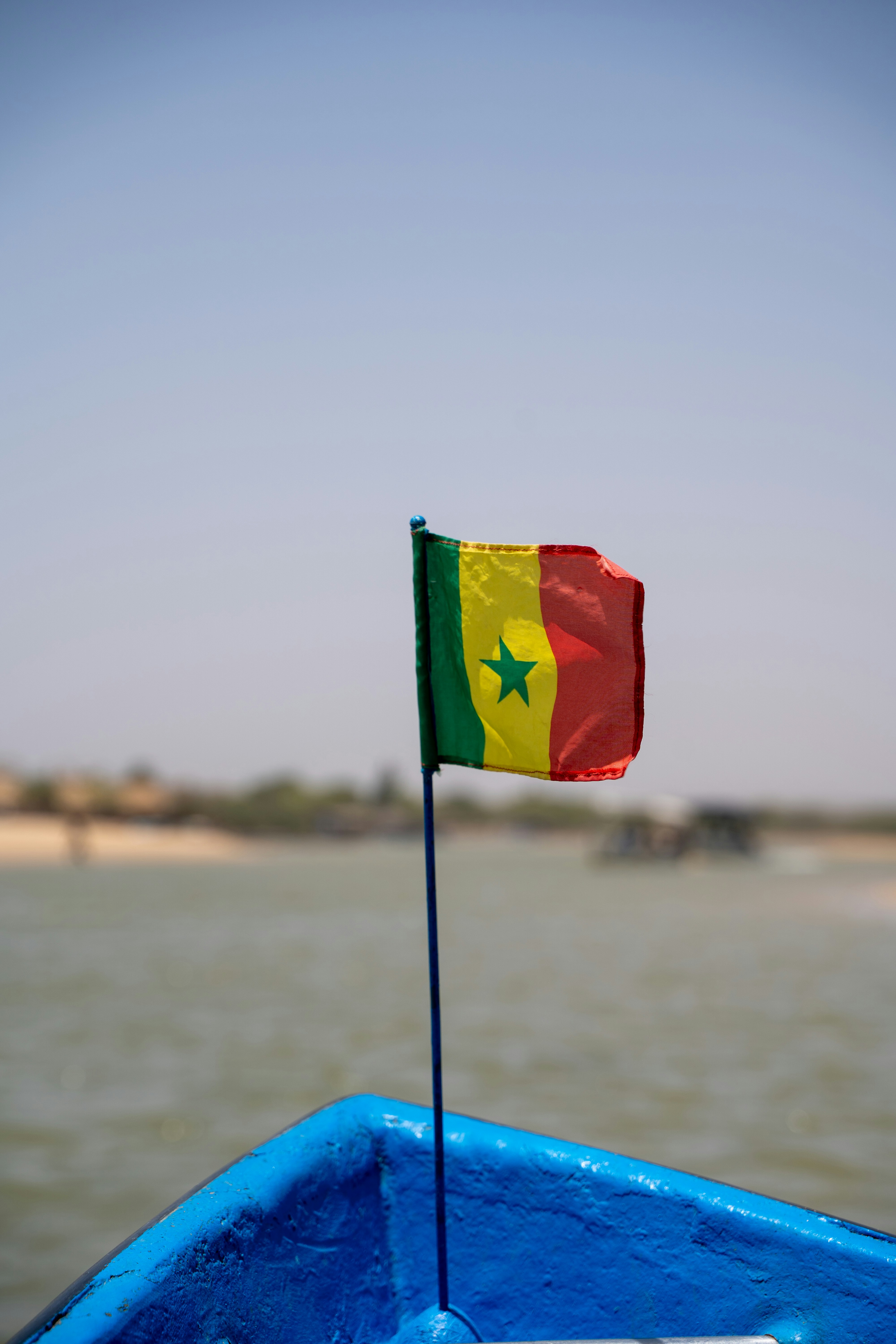 Flag on a Quiet Blue Bow: Senegal’s Signal Above the Water