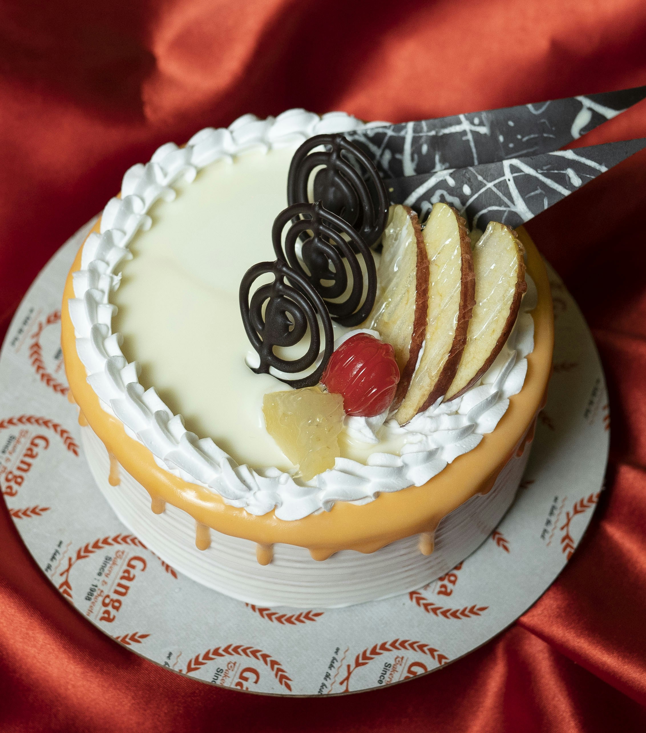 Cream-Gloss Gala: A Strawberry-Orange Celebration Cake