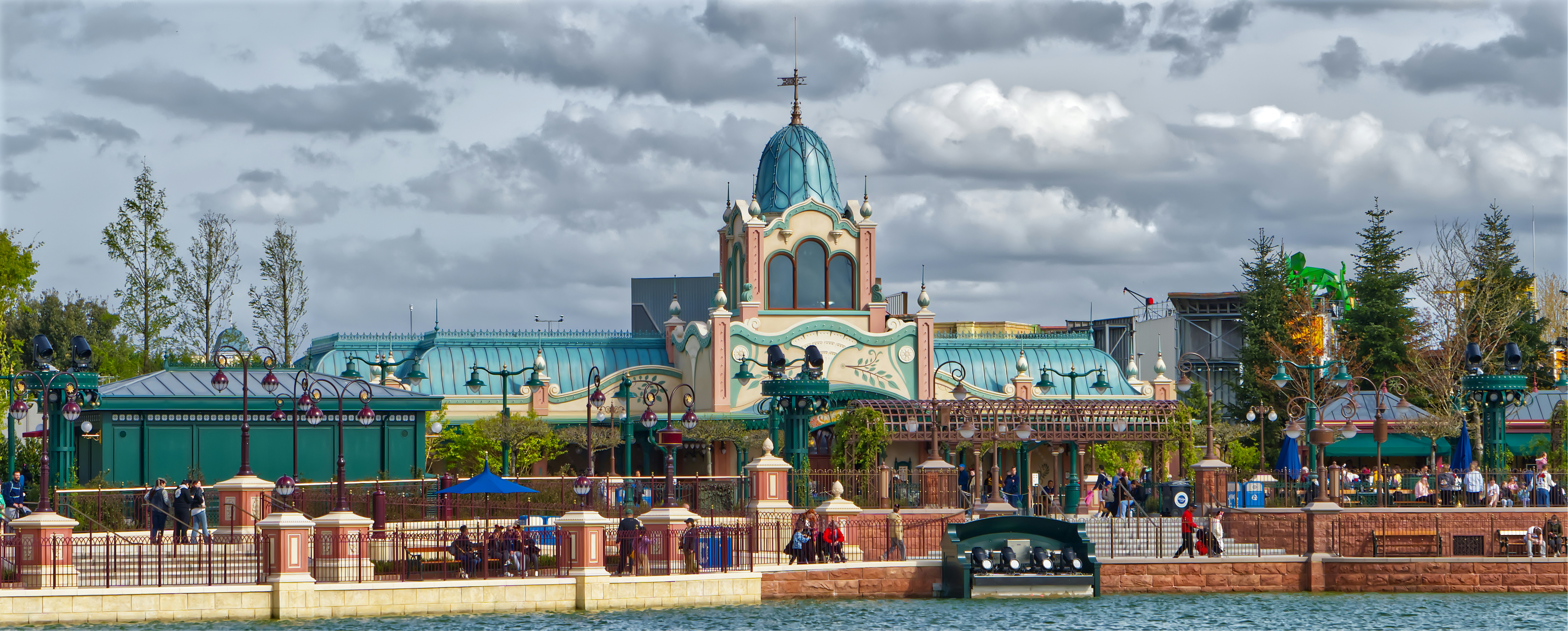Tower on the Waterfront: An Oasis of Turquoise Domes and Waterfront Activity