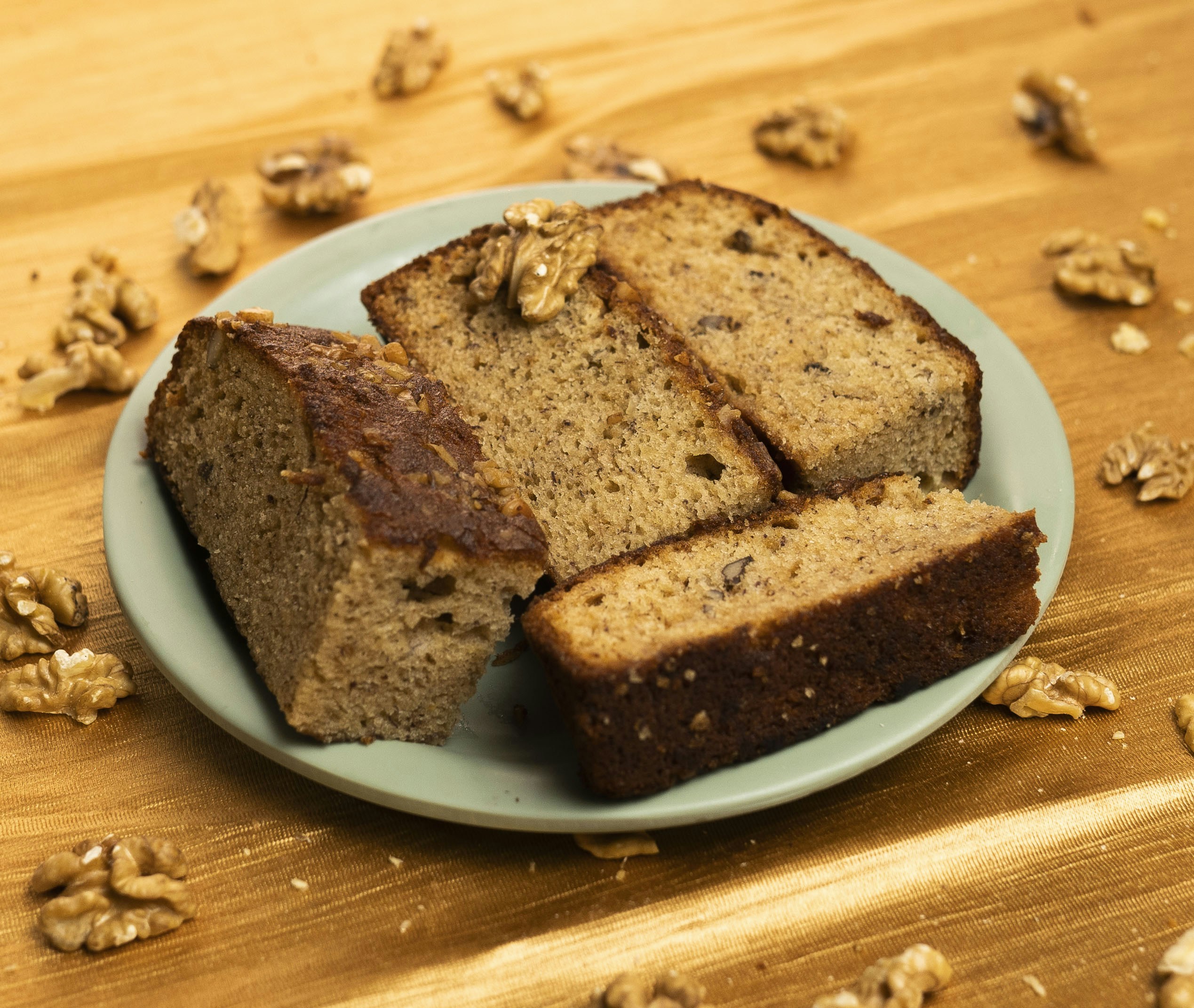Golden Banana Loaf on a Walnut-Studded Platter